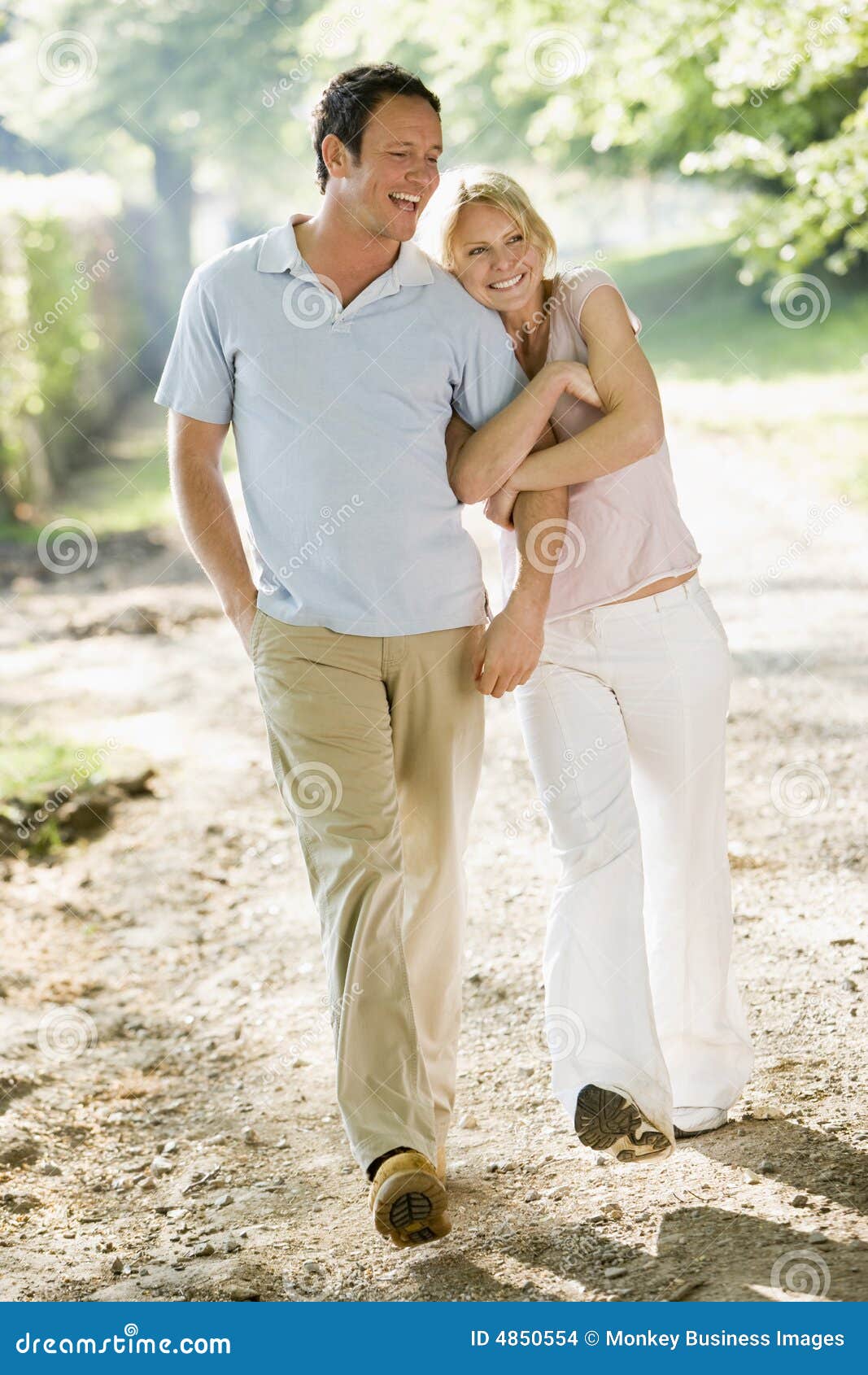 Couple on summer walk stock photo. Image of laughing, loving - 4850554