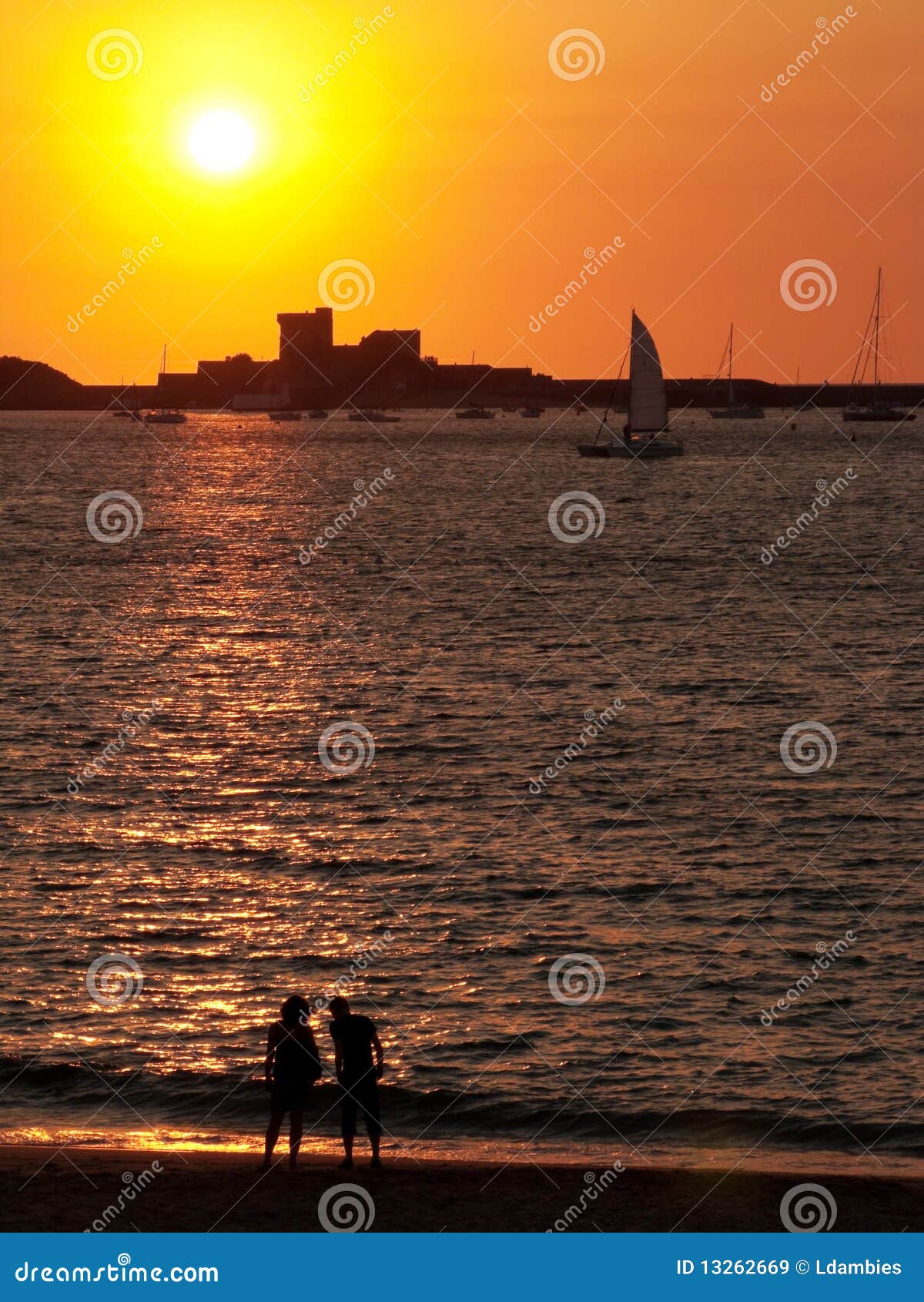 Couple at sunset stock image. Image of resort, orange - 13262669