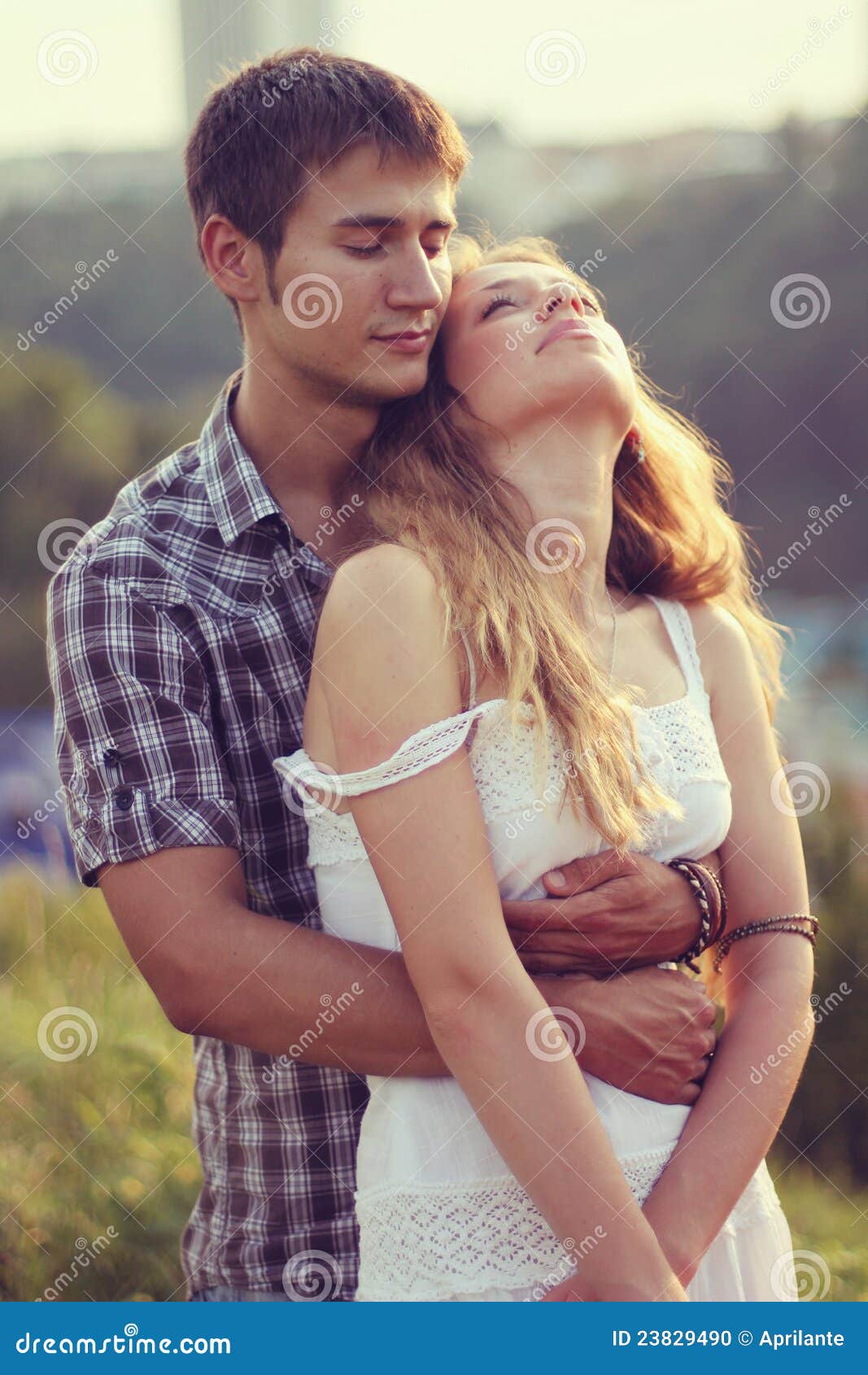Couple at sunset stock photo. Image of happiness, garden - 23829490