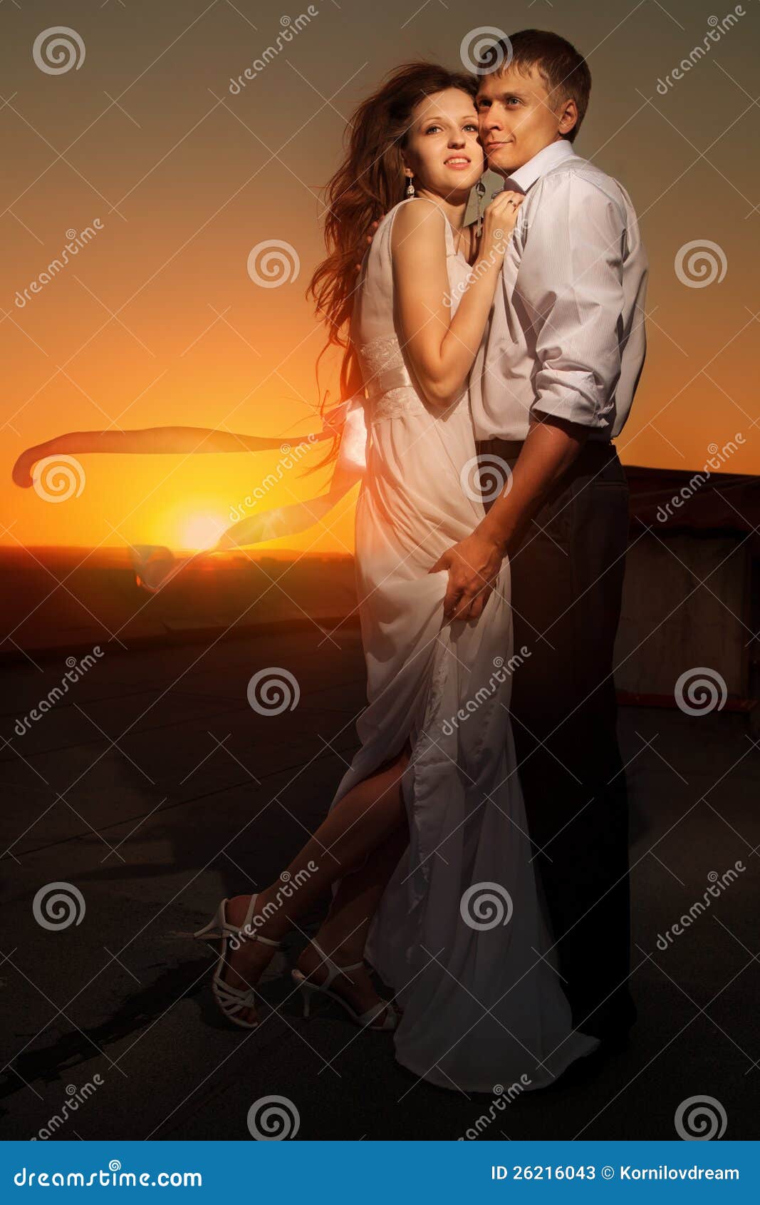 Couple in sunset stock image. Image of person, female - 26216043
