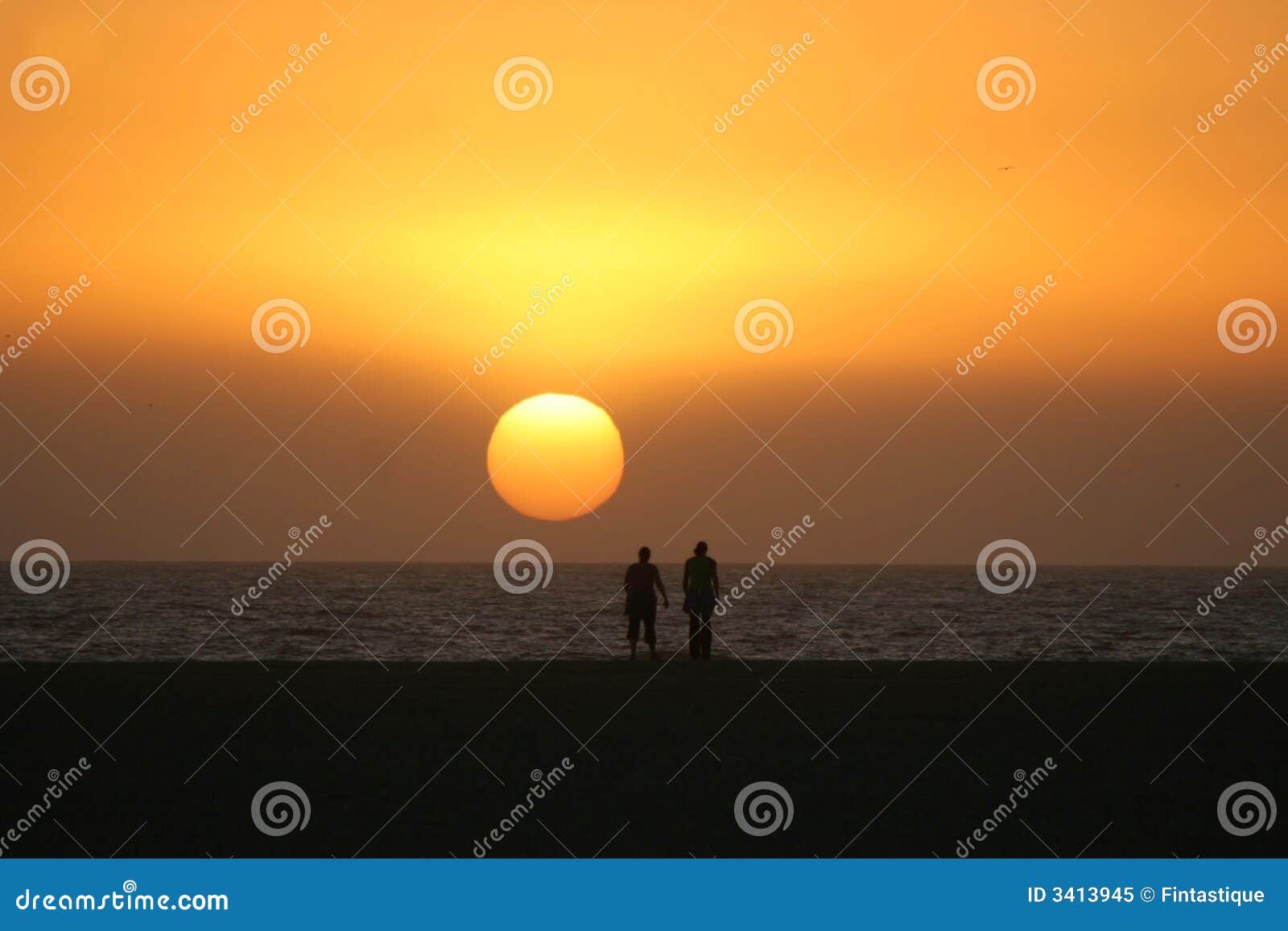 Couple at sunset stock image. Image of walking, shore - 3413945