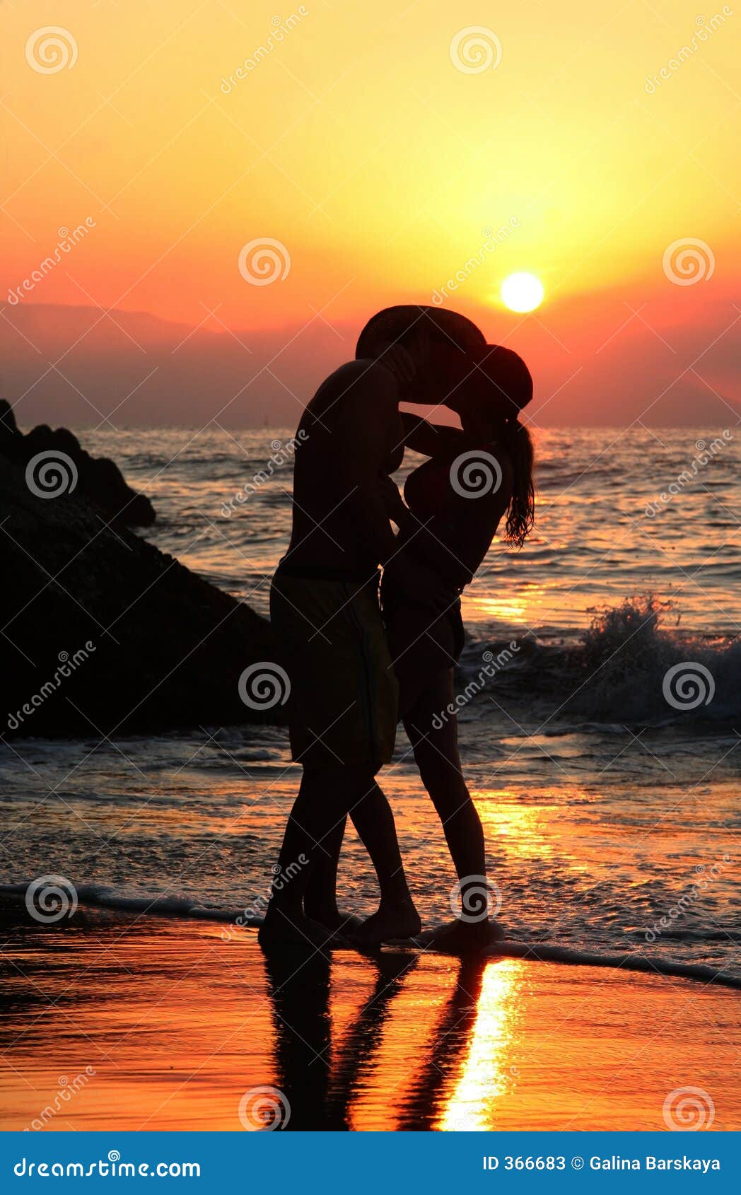 Couple at sunset stock image. Image of female, caring, kissing - 366683