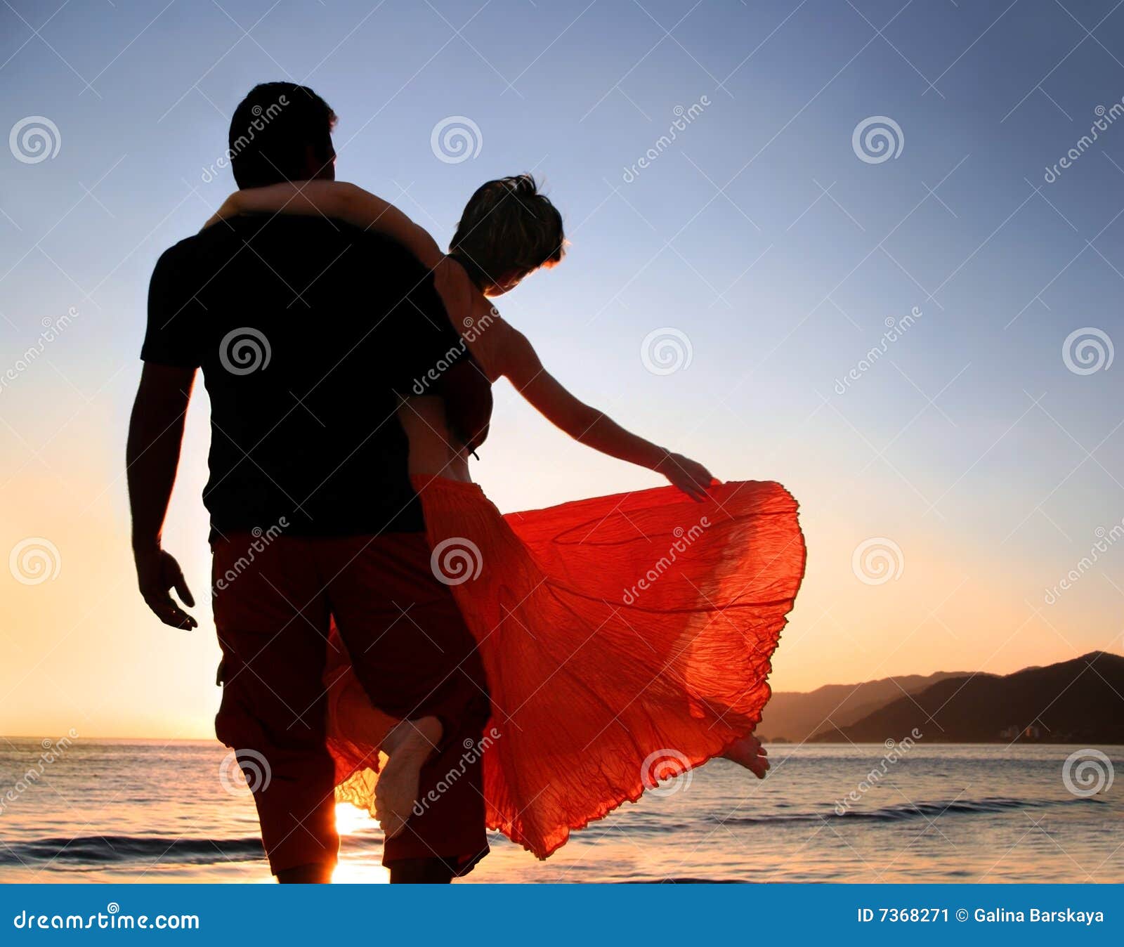 Couple at sunset stock image. Image of girl, exciting - 7368271