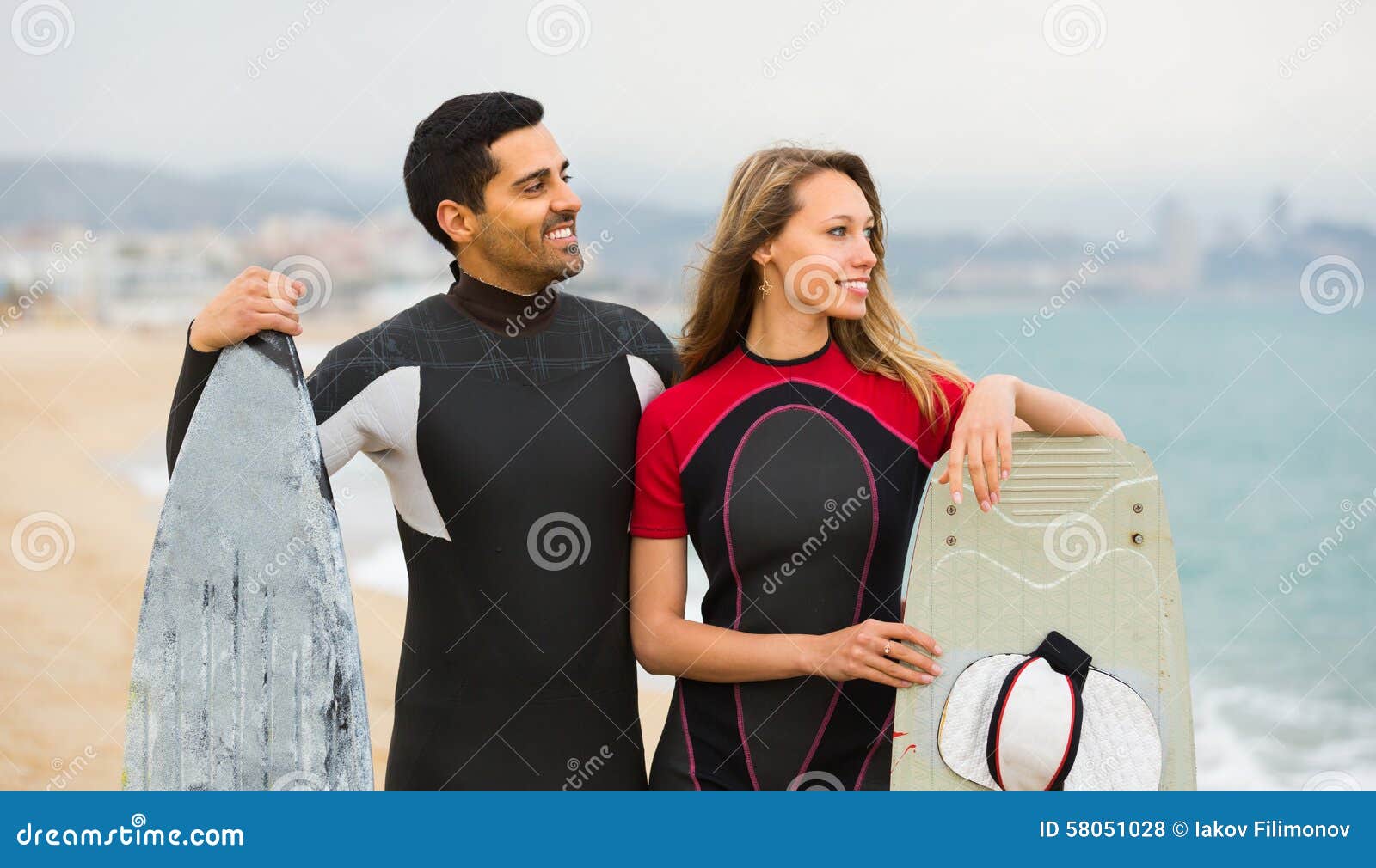 Couple with Surf Boards on the Beach Stock Photo - Image of shore ...