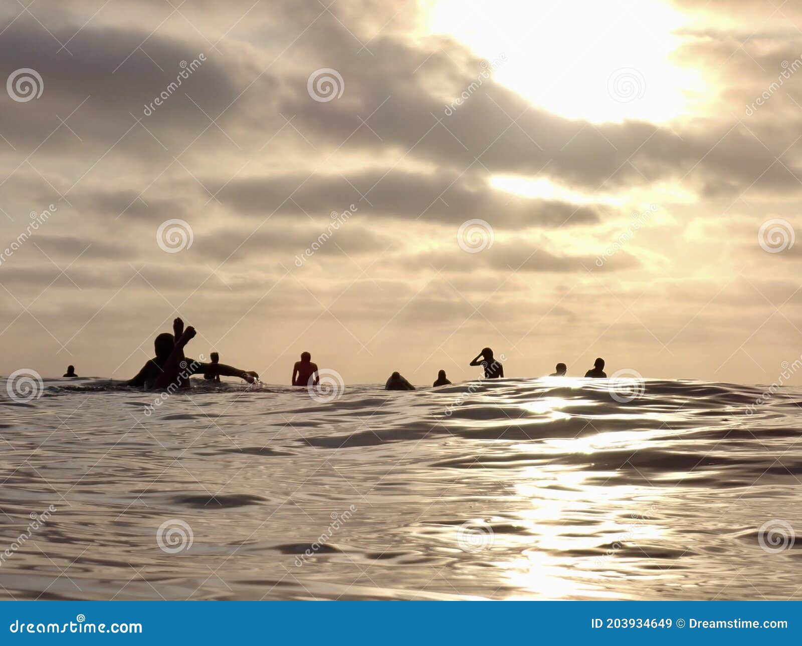 Surf lineup at sunset stock image. Image of vehicle - 203934649