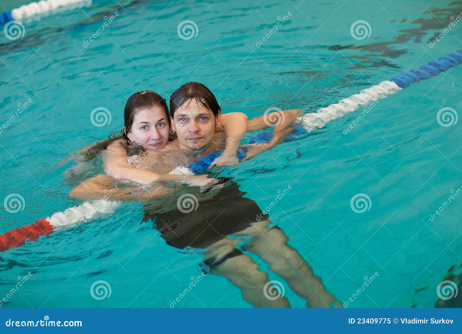 Couple in a swimming pool stock image. Image of leisure - 23409775