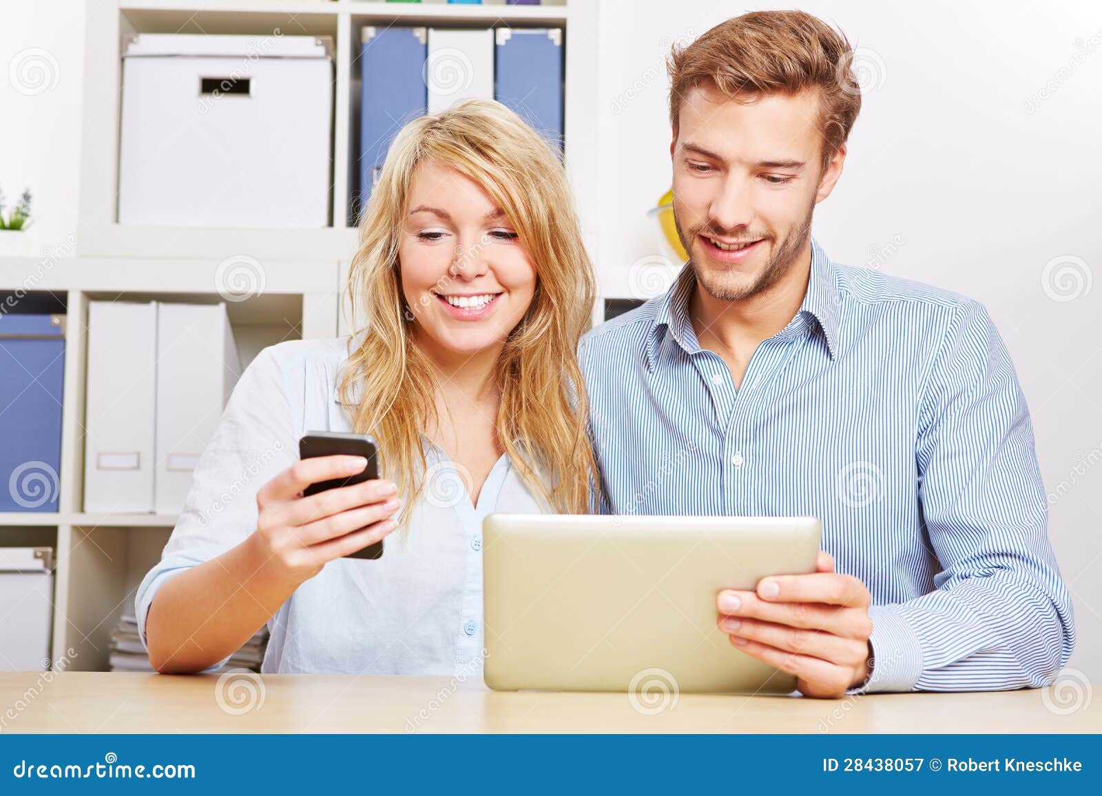 Couple Synchronising Smartphone Stock Image - Image of online, typing ...