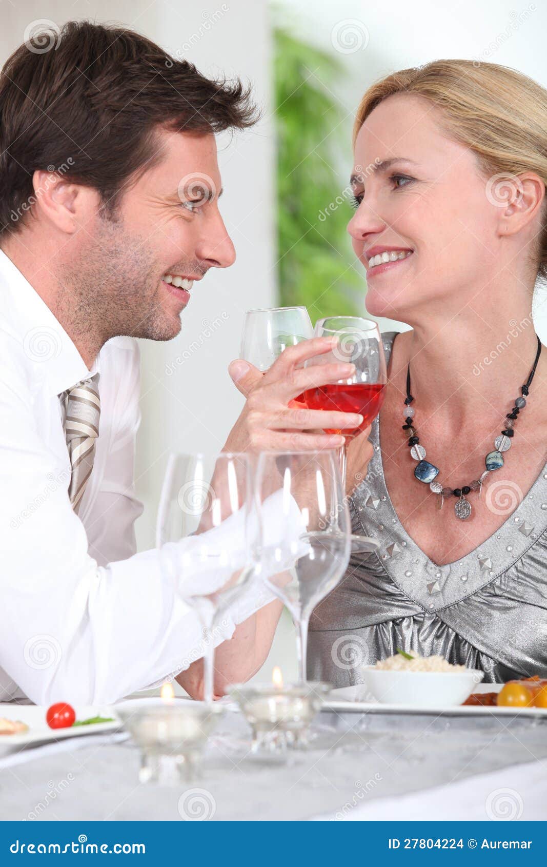 Couple at a table stock photo. Image of food, smiling - 27804224