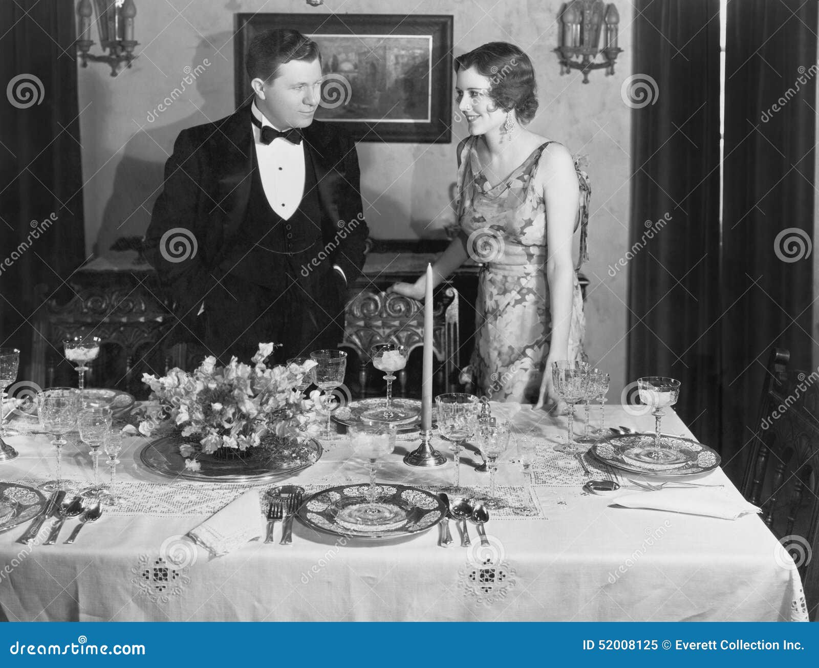 Couple with Table Set for Dinner Stock Image - Image of entertaining ...