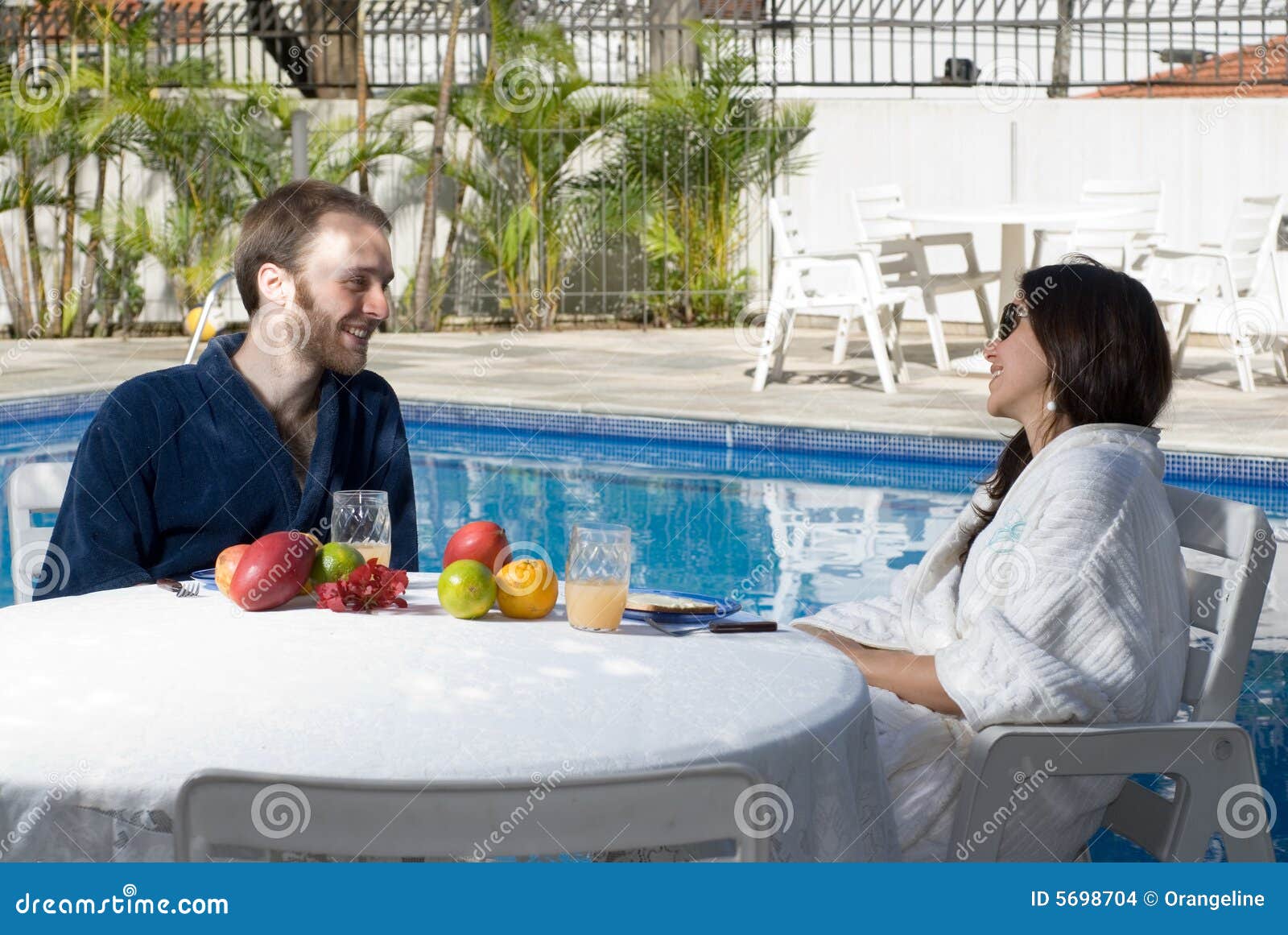 Couple at Table, Smiling - Horizontal Stock Photo - Image of peaceful ...