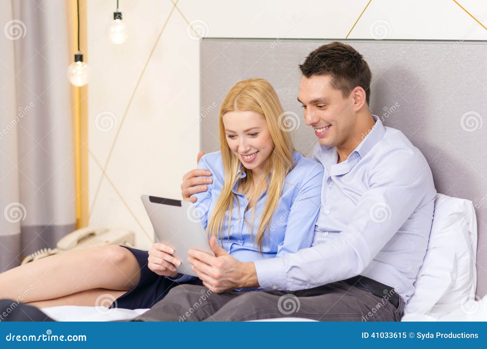 Couple with Tablet Pc Computer in Hotel Room Stock Image - Image of ...