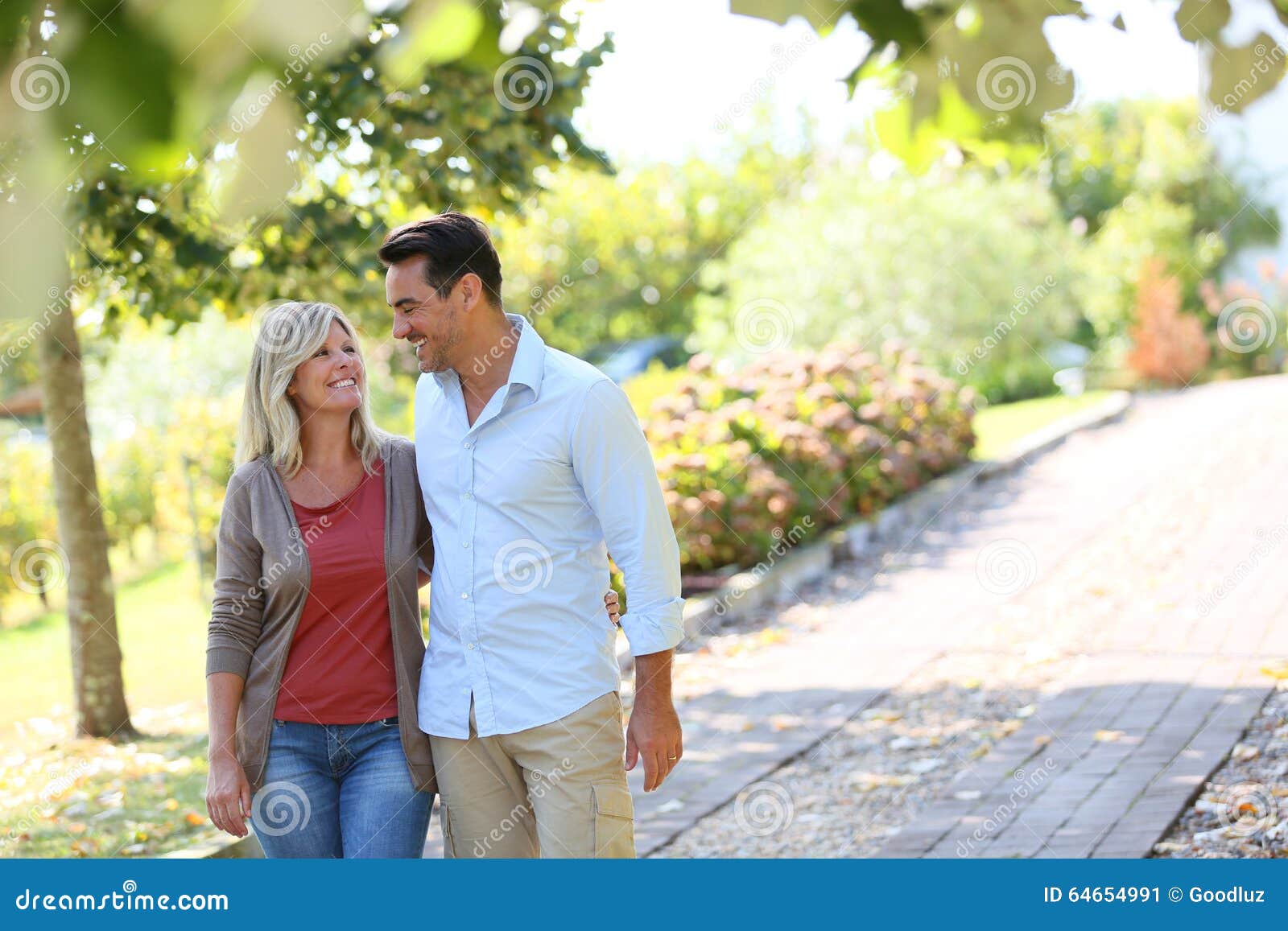 Couple Taking a Walk in Countryside Stock Image - Image of aged, smile ...