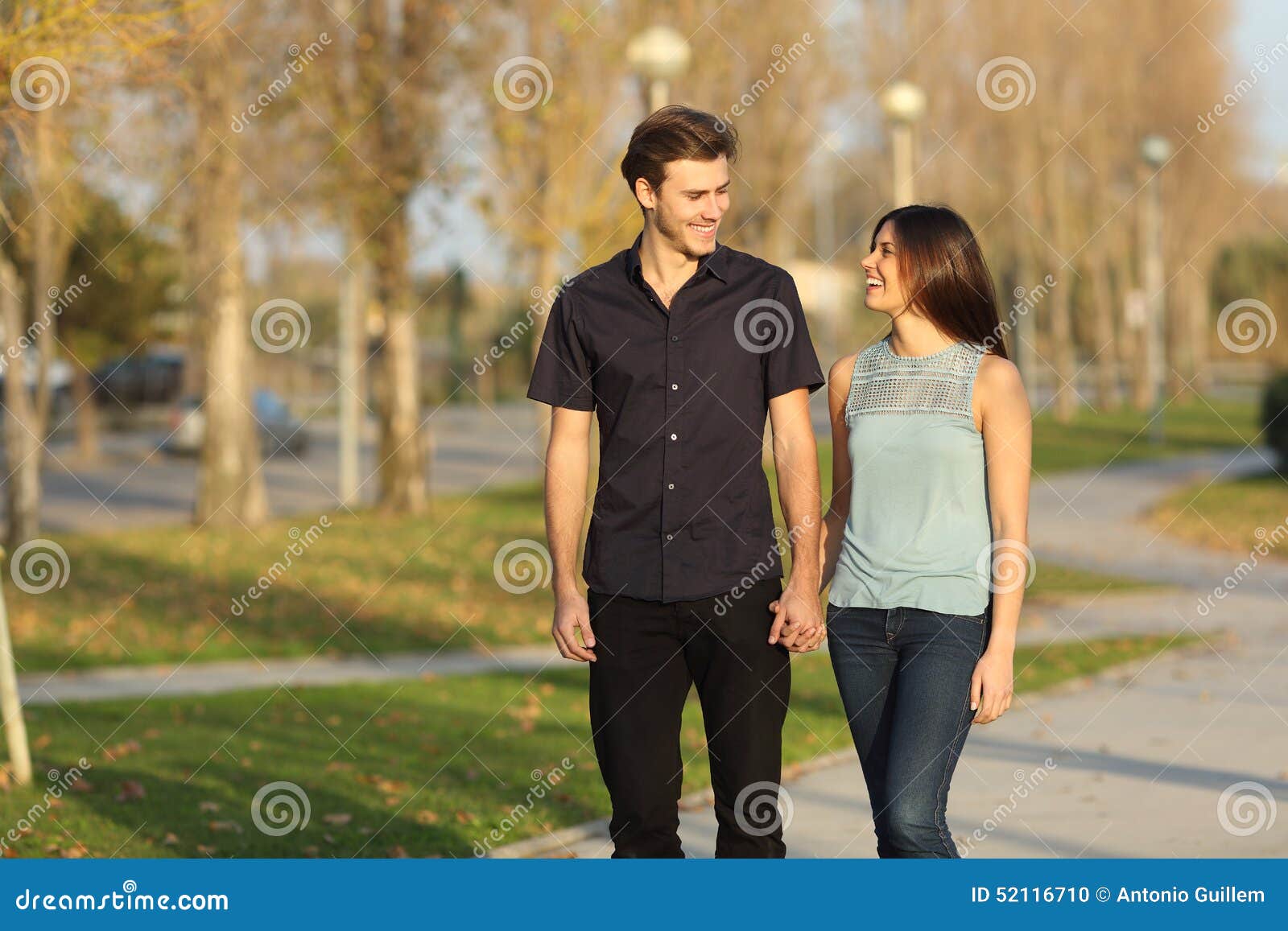 Couple Taking a Walk in a Park Stock Photo - Image of affectionate ...