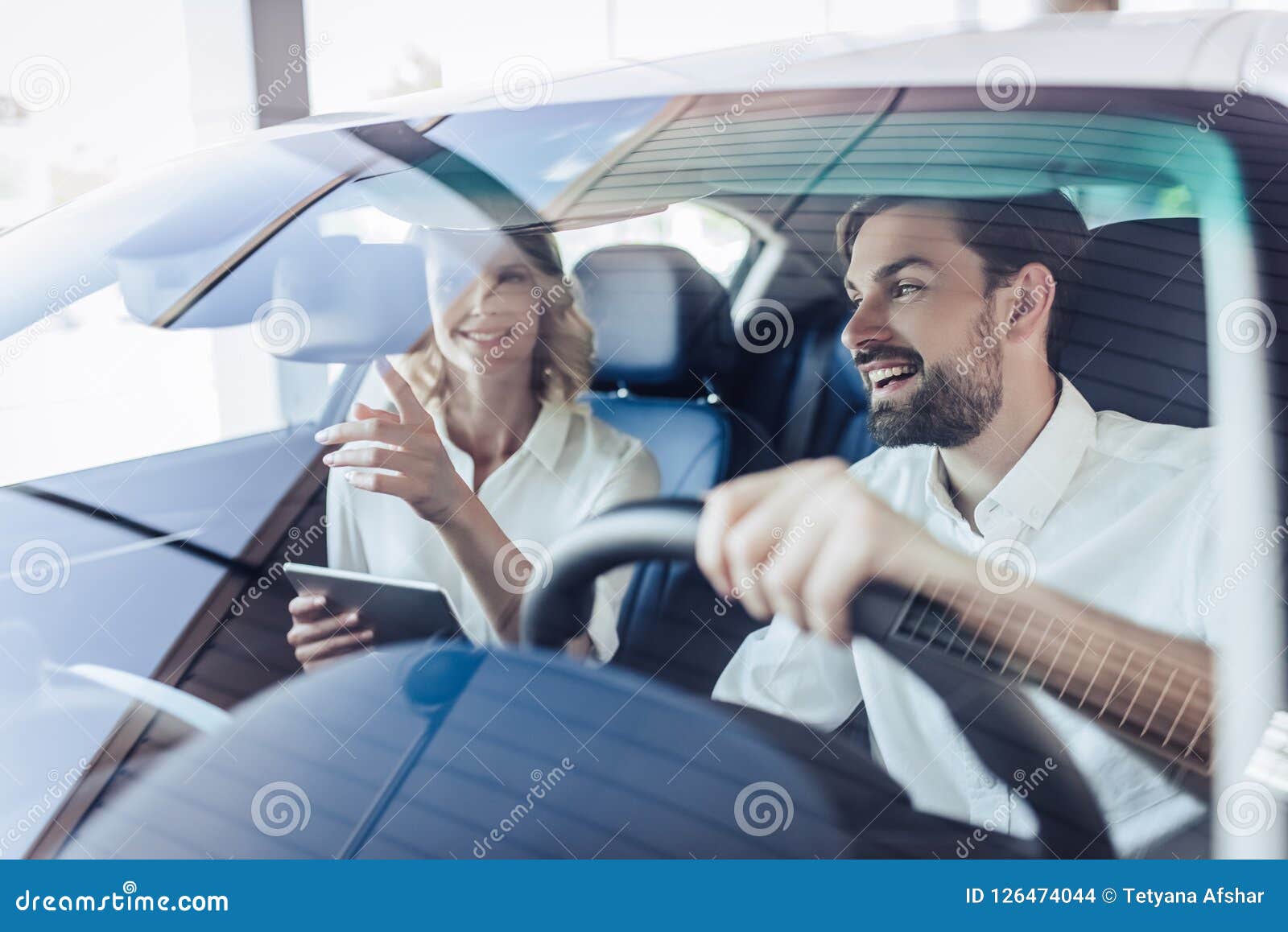 Couple Talking while Driving a Car Stock Photo - Image of people ...