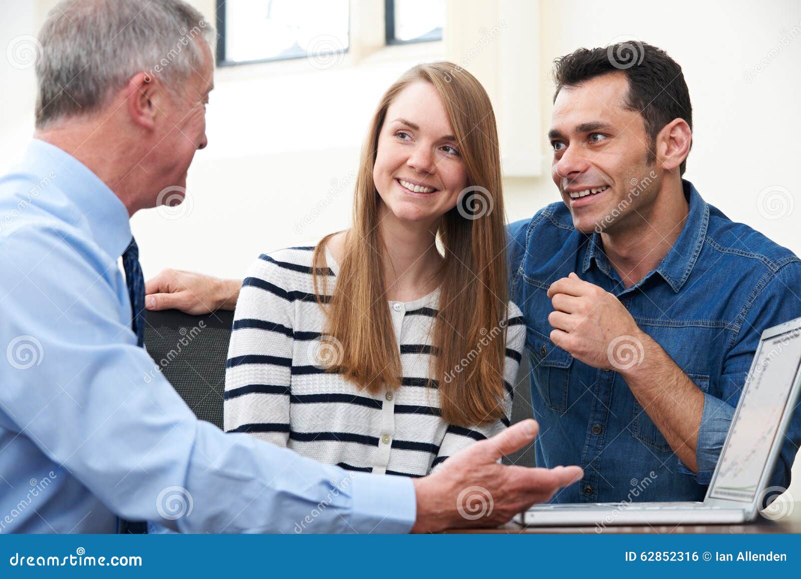 Couple Talking with Financial Advisor in Office Stock Photo - Image of ...