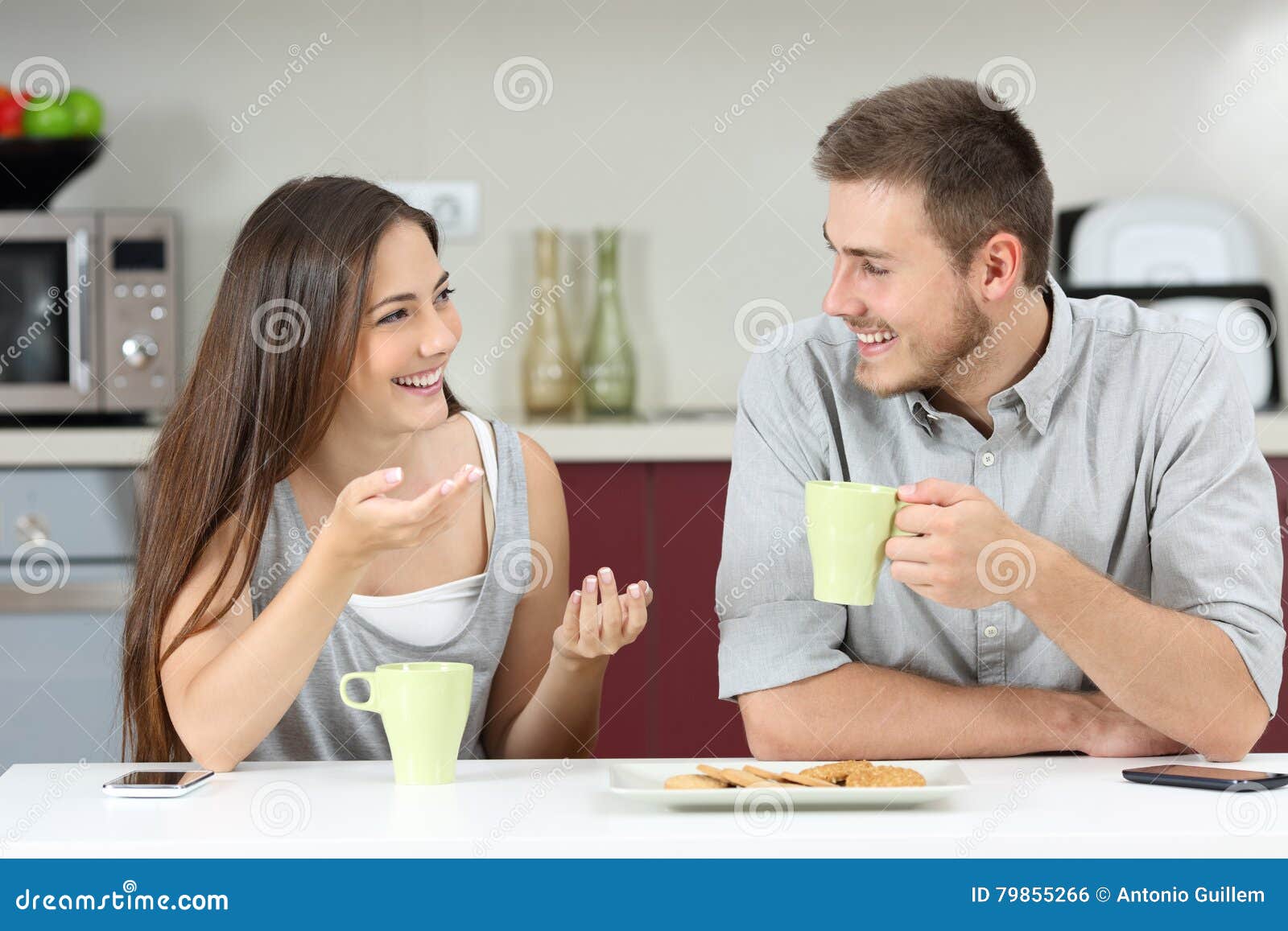 Couple Talking in the Kitchen Stock Photo - Image of breakfast ...