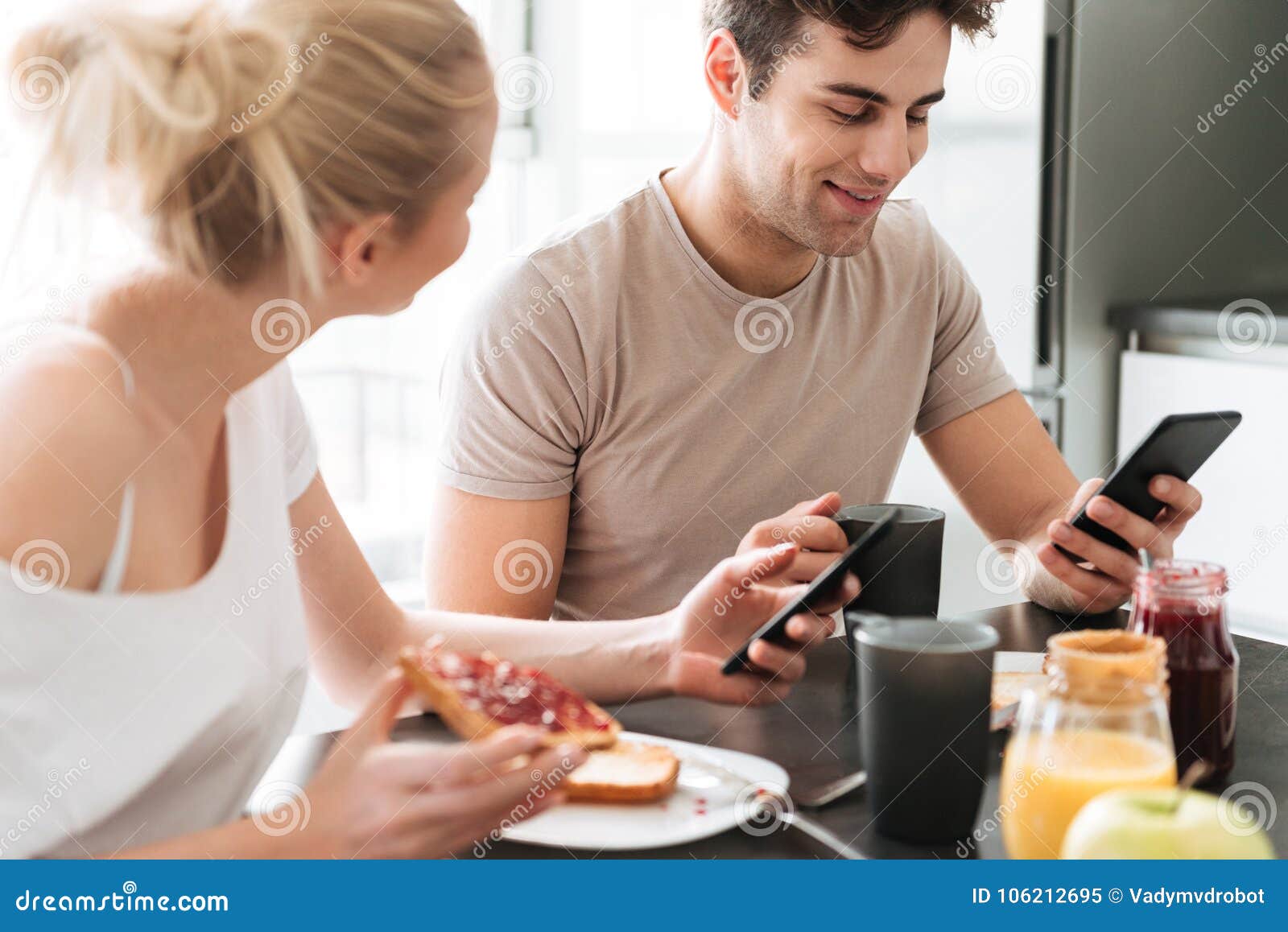 Couple Talking in Kitchen while Have Breakfast Stock Image - Image of ...