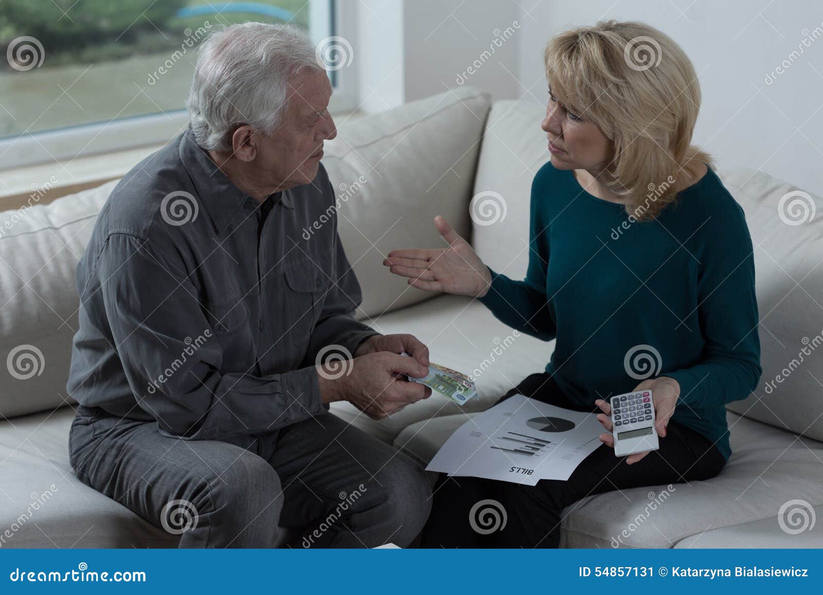 Couple talking about money stock image. Image of grandfather - 54857131