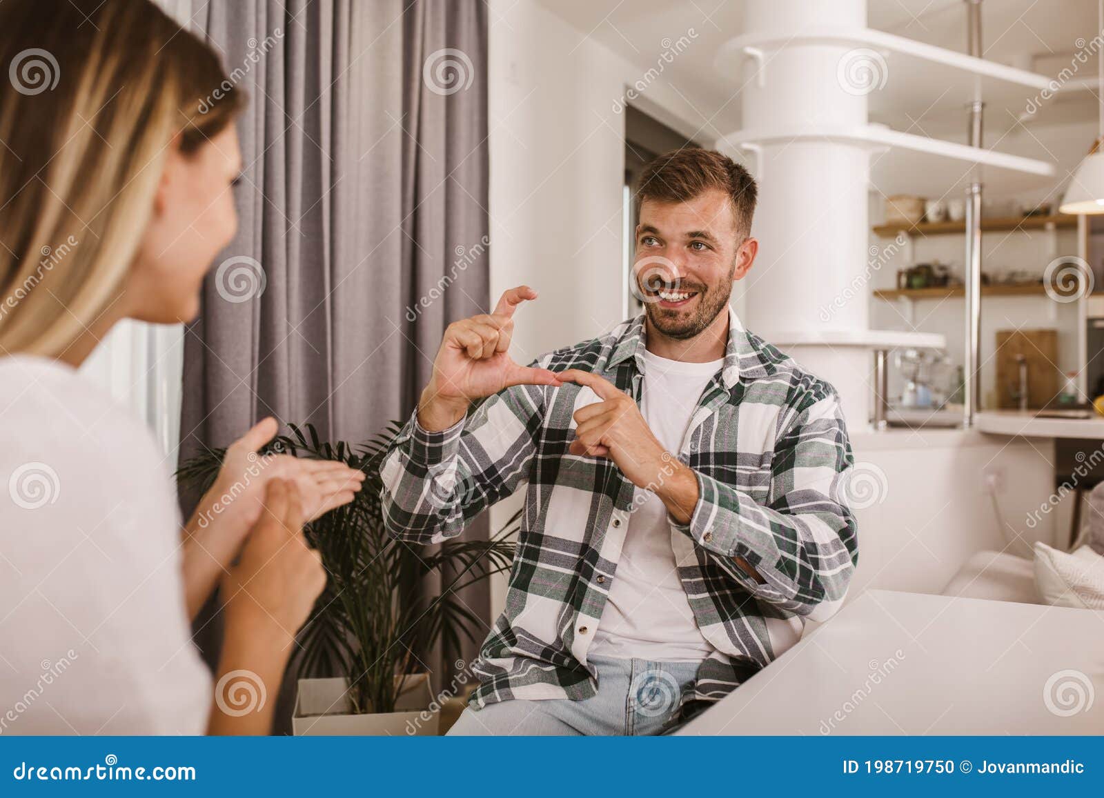 Couple Talking Using Sign Language at Home Stock Photo - Image of ...