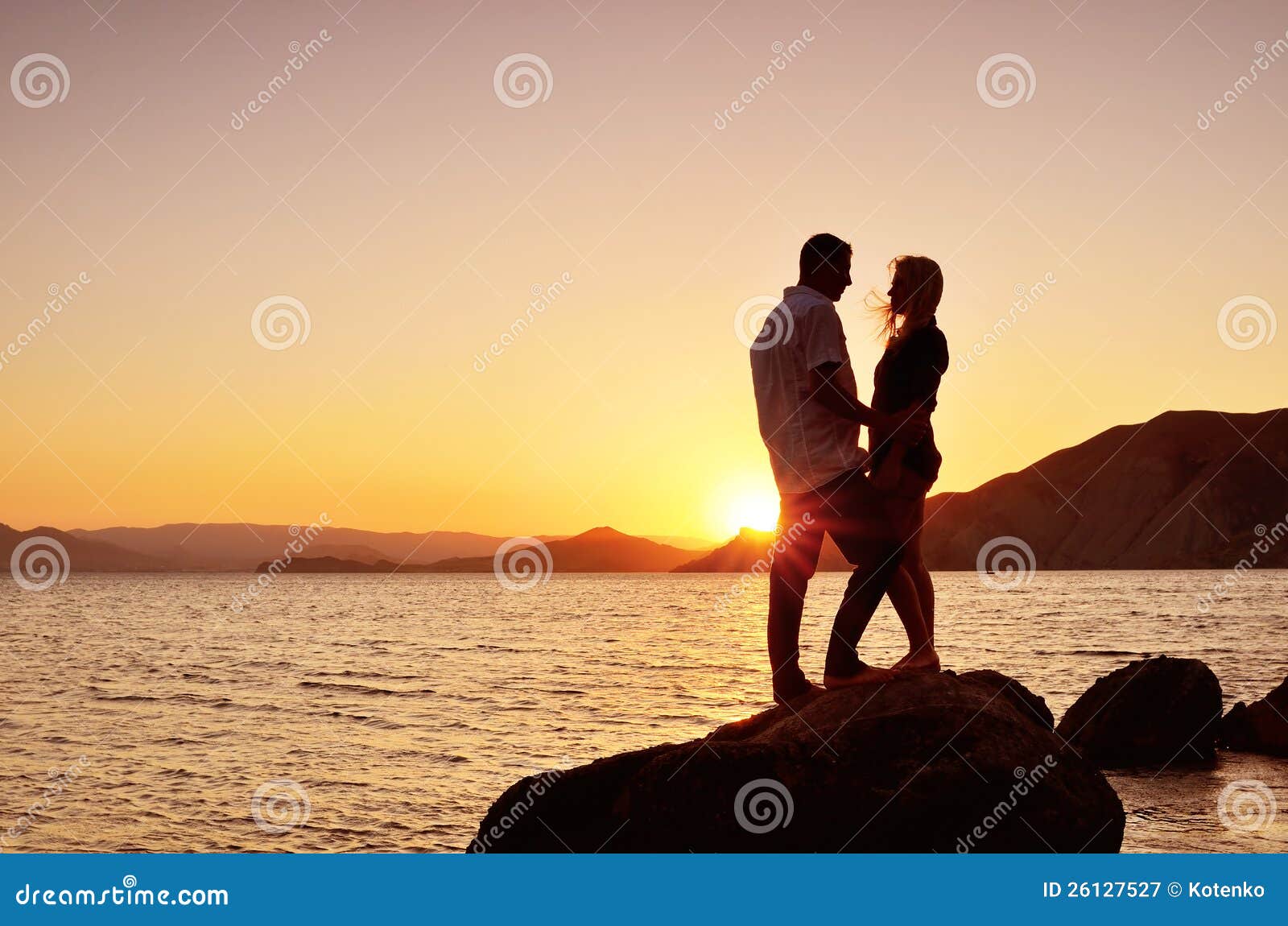 Couple talks at the sea stock image. Image of outdoor - 26127527