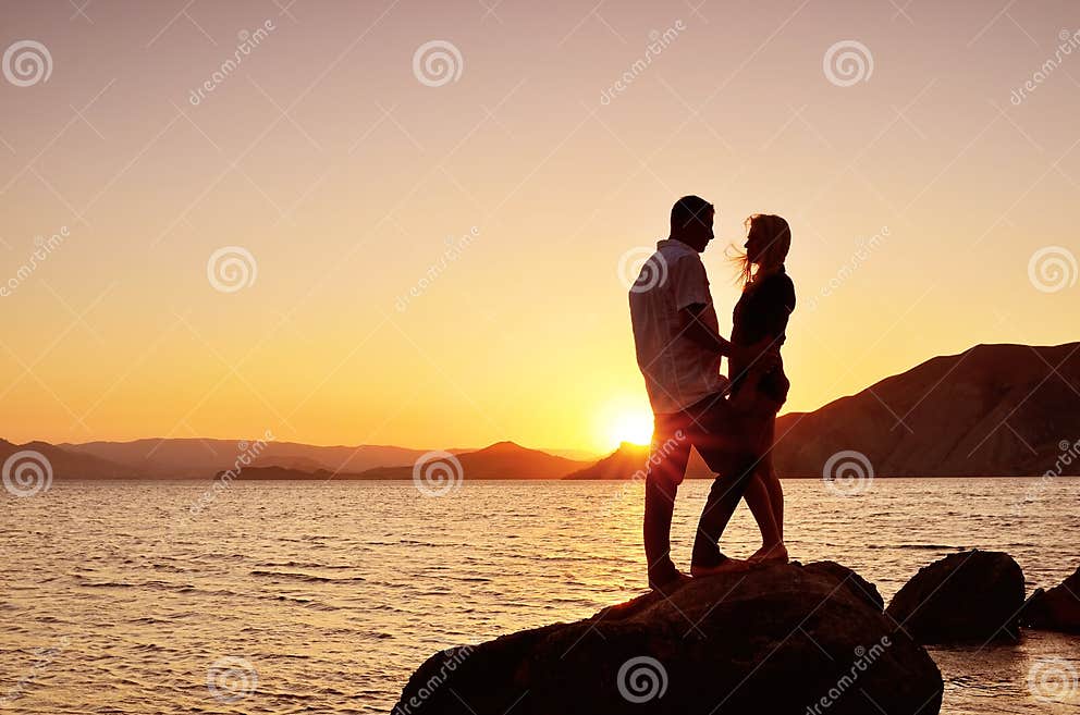 Couple talks at the sea stock image. Image of outdoor - 26127527