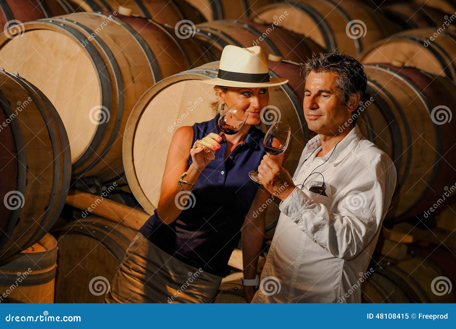 Couple Tasting Wine in a Cellar Stock Image - Image of process ...
