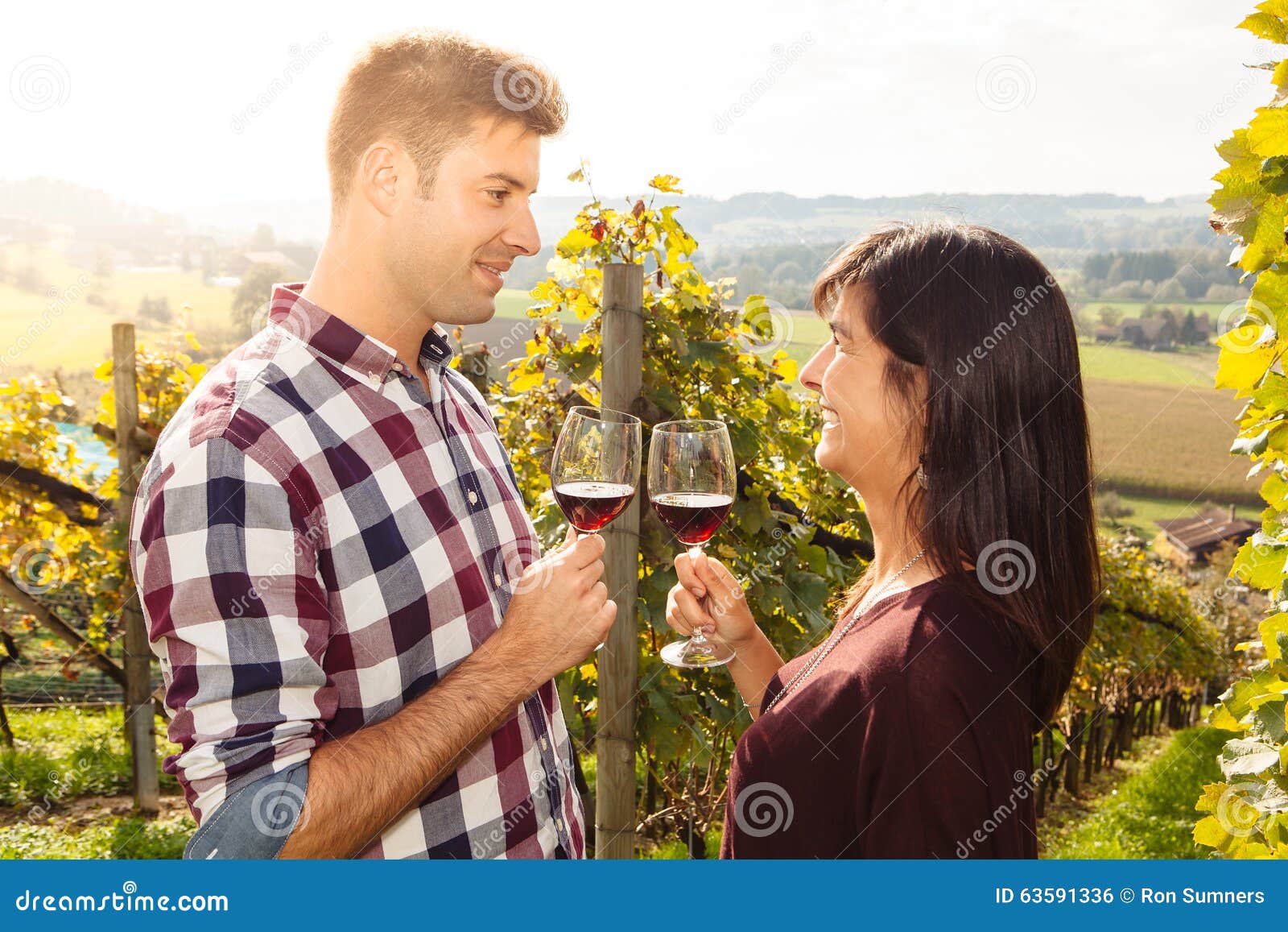 Couple Tasting Wine in a Vineyard Stock Photo - Image of romance, glass ...