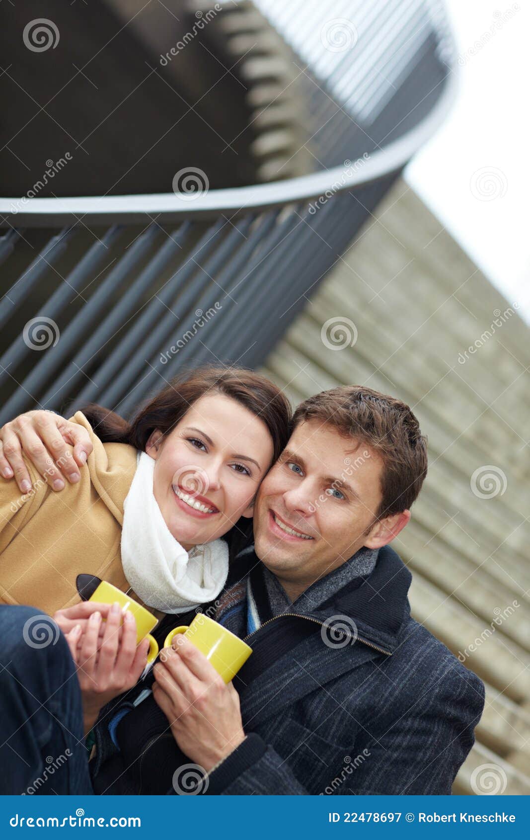 Couple with tea in city stock image. Image of levels - 22478697