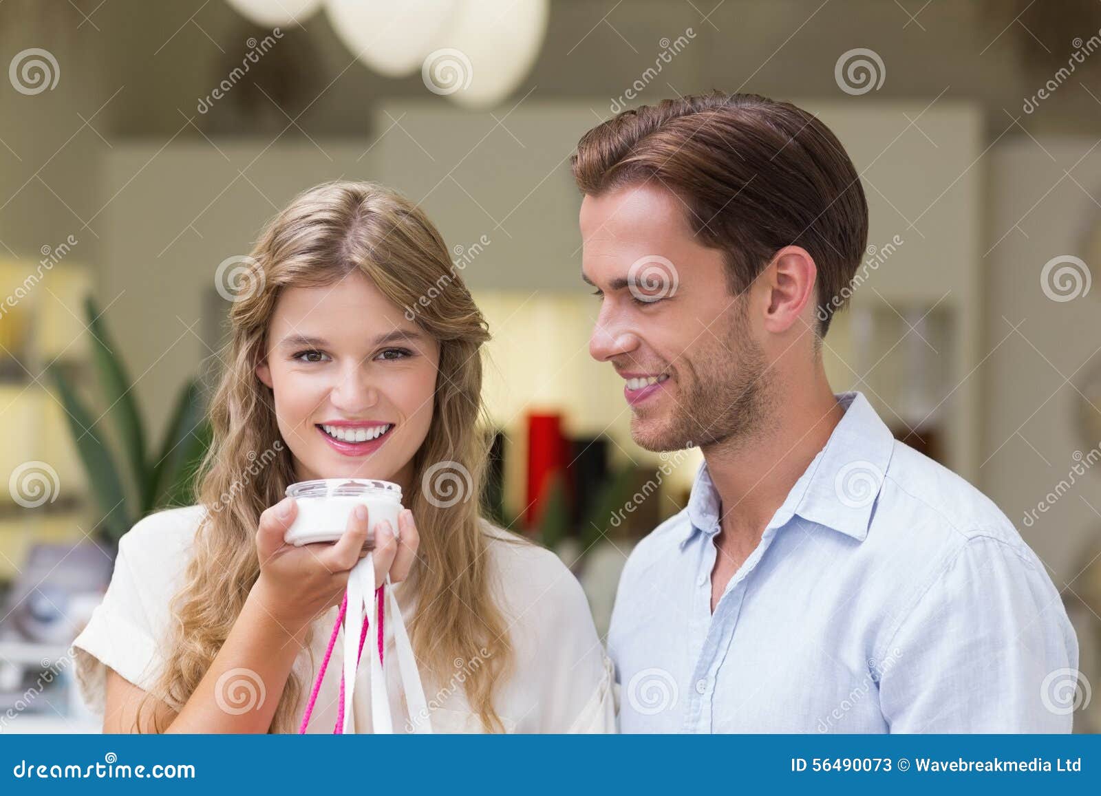 A Couple Testing a Sample of Beauty Products Stock Image - Image of ...