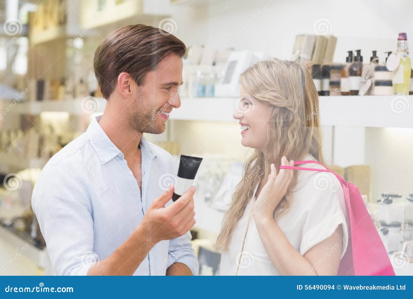 A Couple Testing a Sample of Beauty Products Stock Photo - Image of ...
