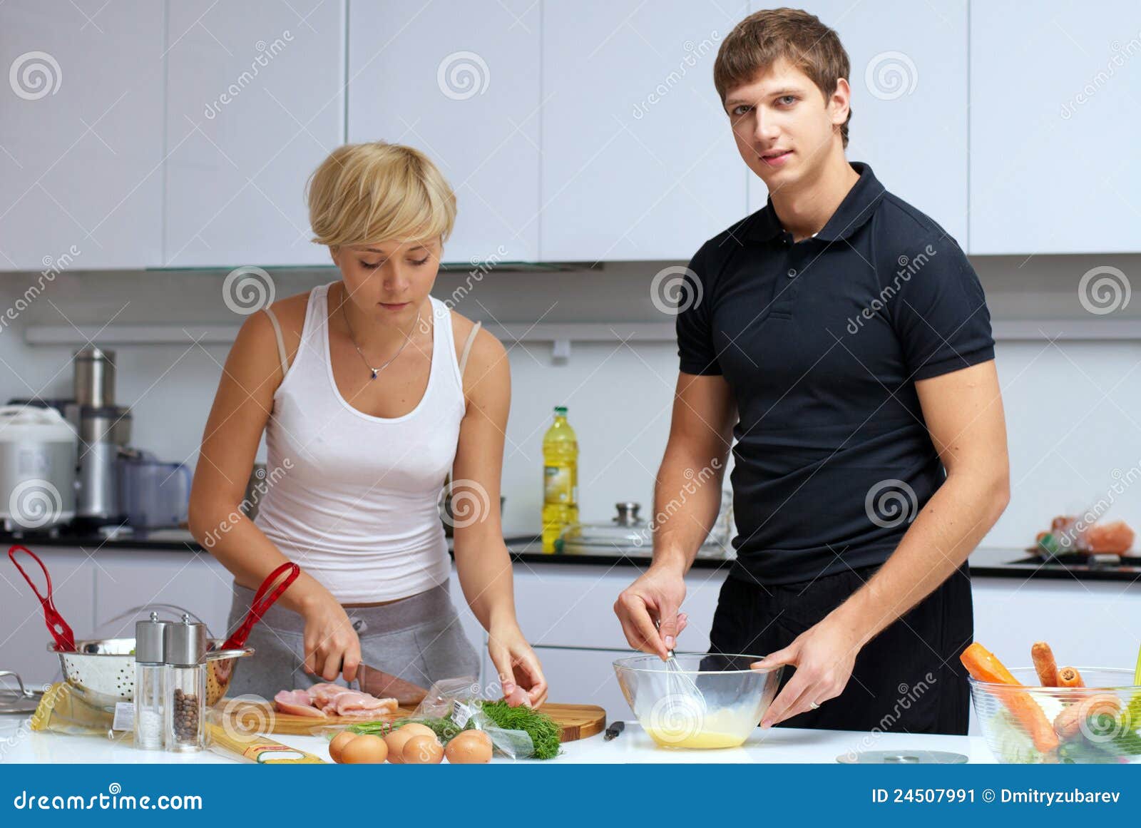 Couple in Their Kitchen Making Dinner Stock Image - Image of passionate ...