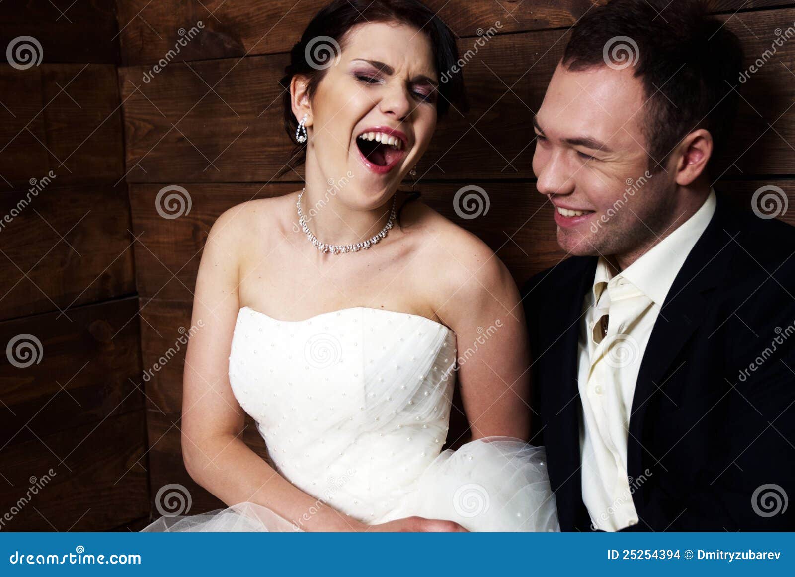 Couple in Their Wedding Clothes in Barn Laughing Stock Photo - Image of ...
