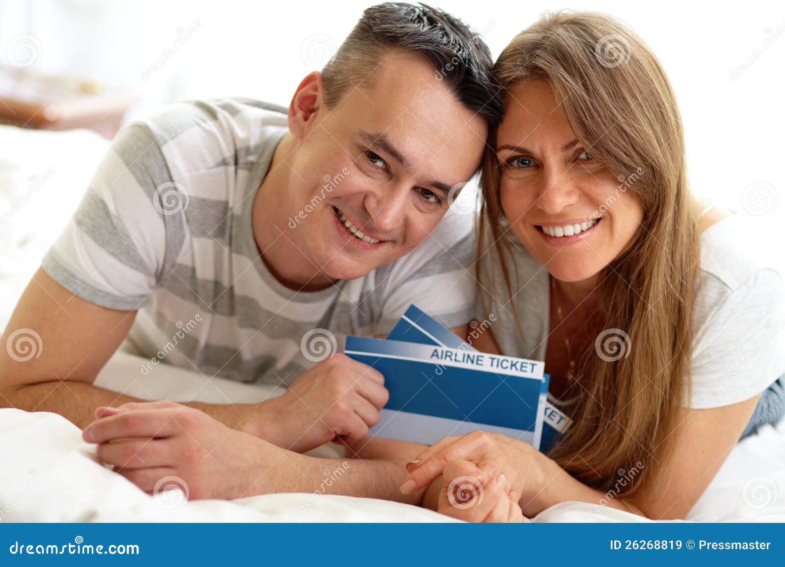 Couple with tickets stock image. Image of airplane, expression - 26268819
