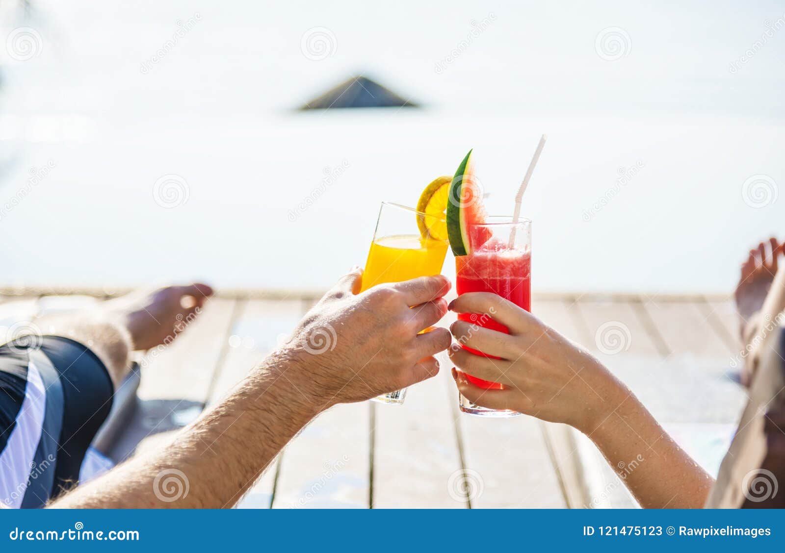 Couple Toasting with Cocktails by the Pool Stock Image - Image of ...