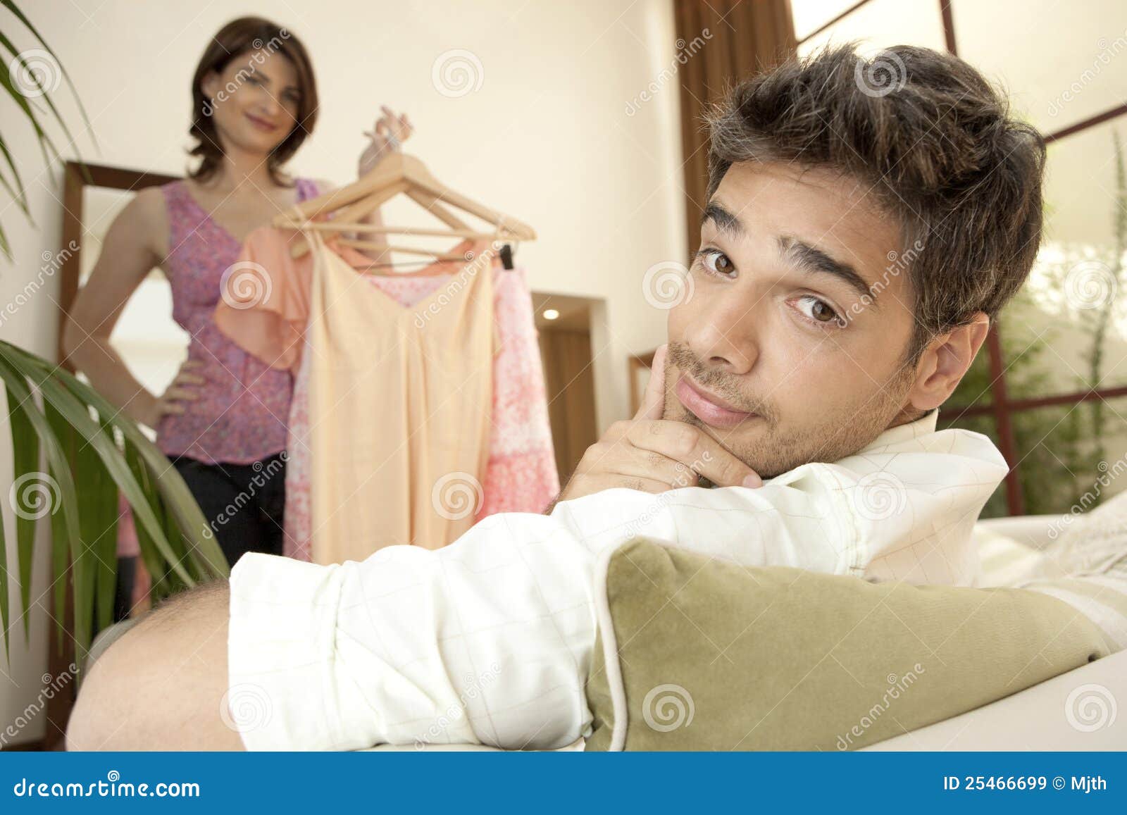 Couple Trying Clothes in Shop Stock Image - Image of interior, leaves ...
