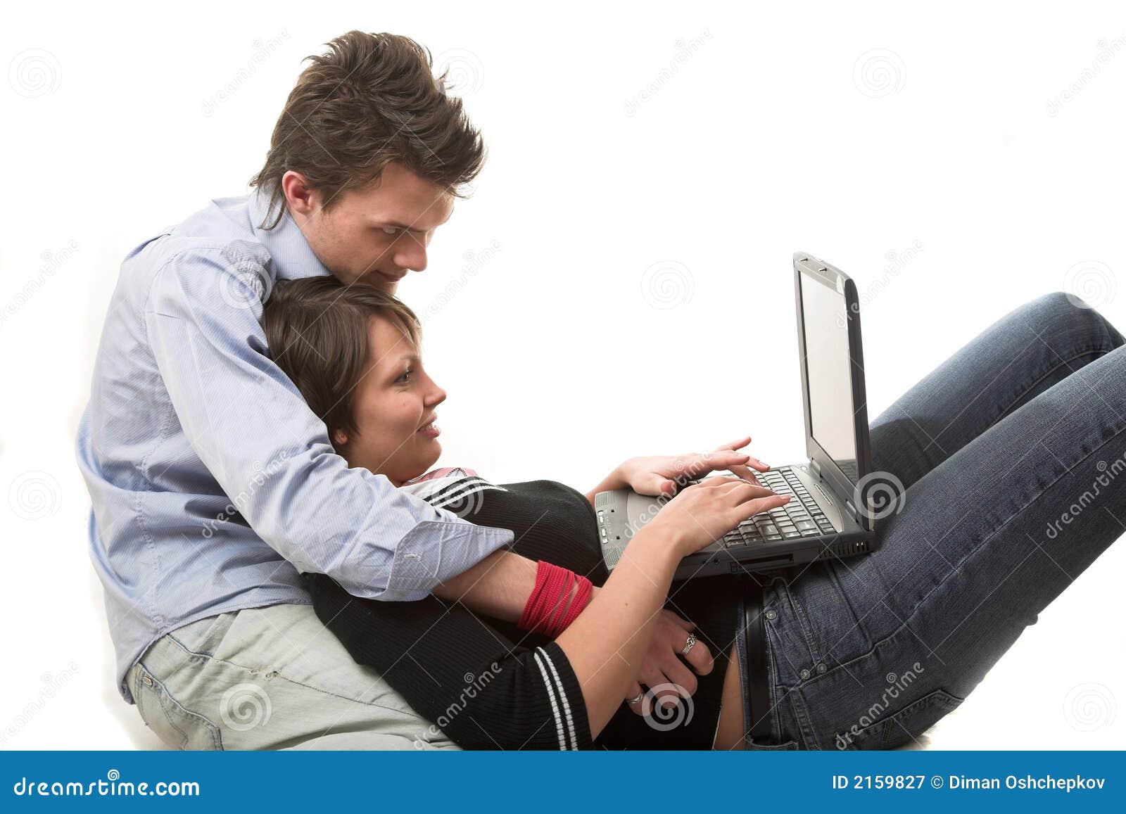 Couple typing at notebook stock image. Image of loving - 2159827