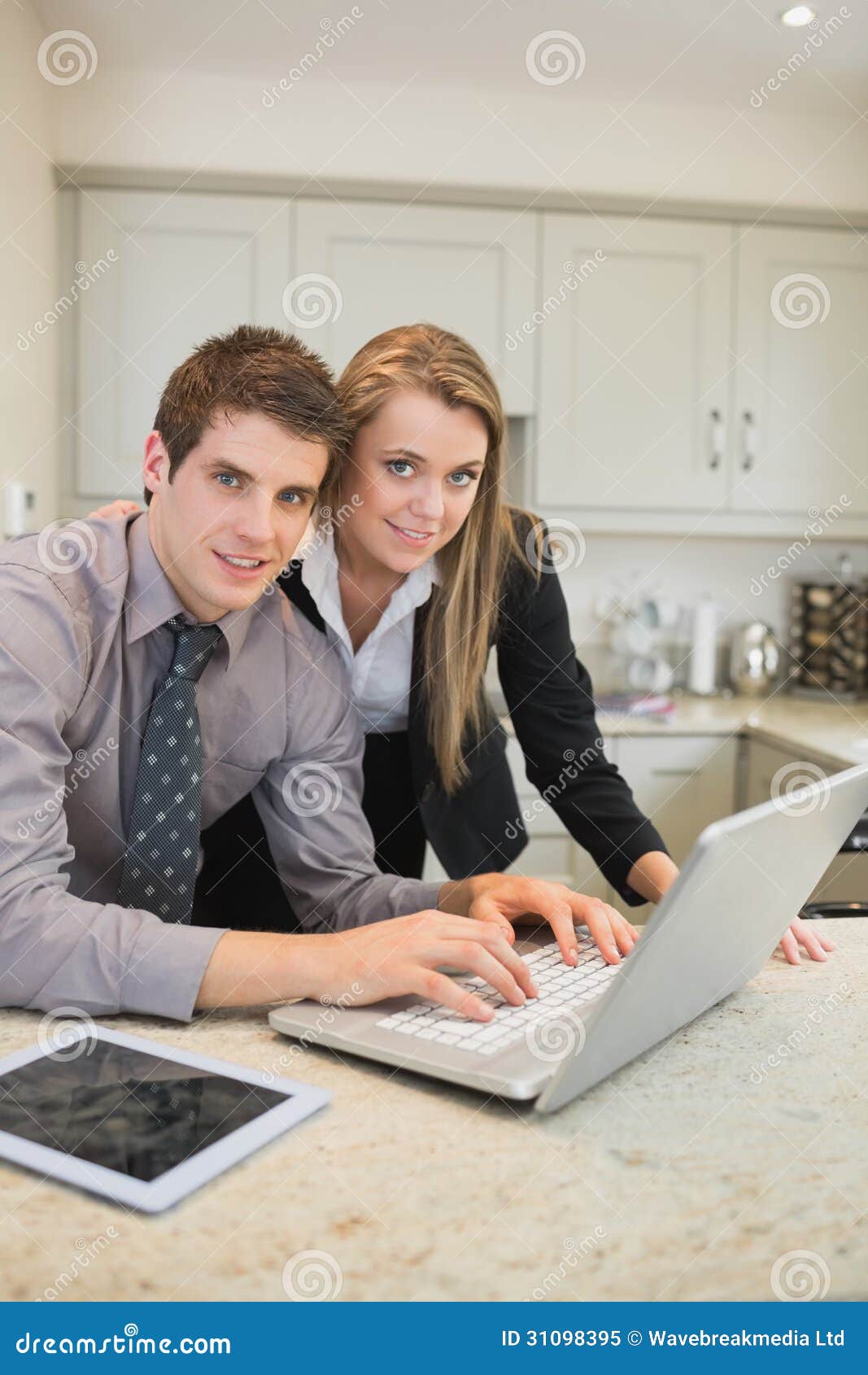 Couple Typing on the Notebook Stock Image - Image of standing ...