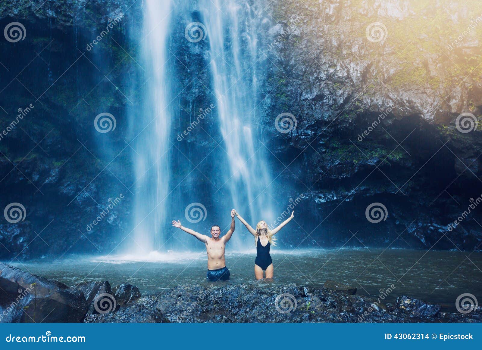 Couple under waterfall stock photo. Image of national - 43062314