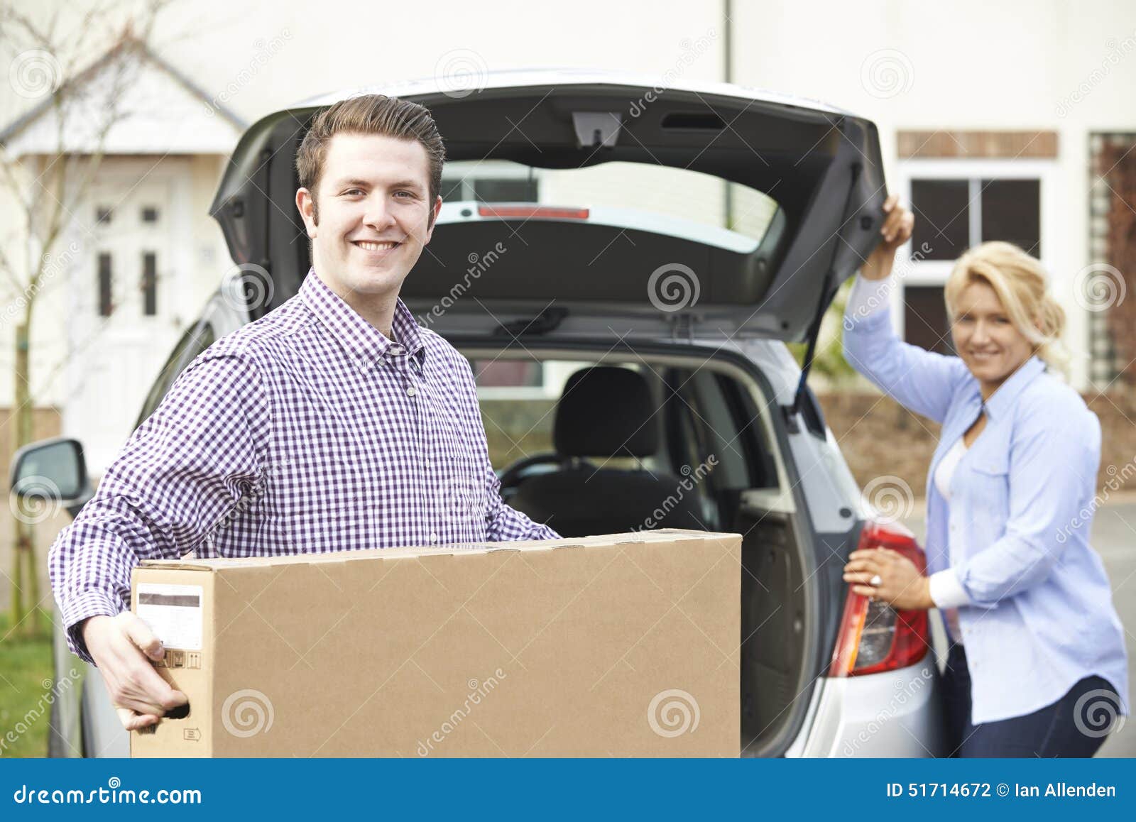 Couple Unloading New Television from Car Trunk Stock Photo - Image of ...