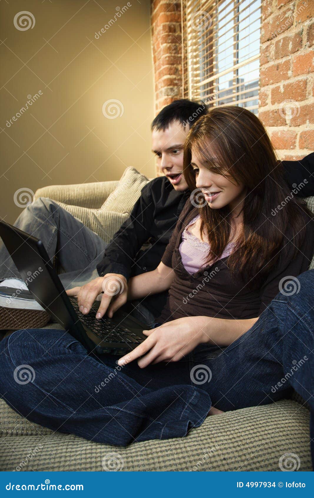 Couple using computer stock photo. Image of love, furnishing - 4997934