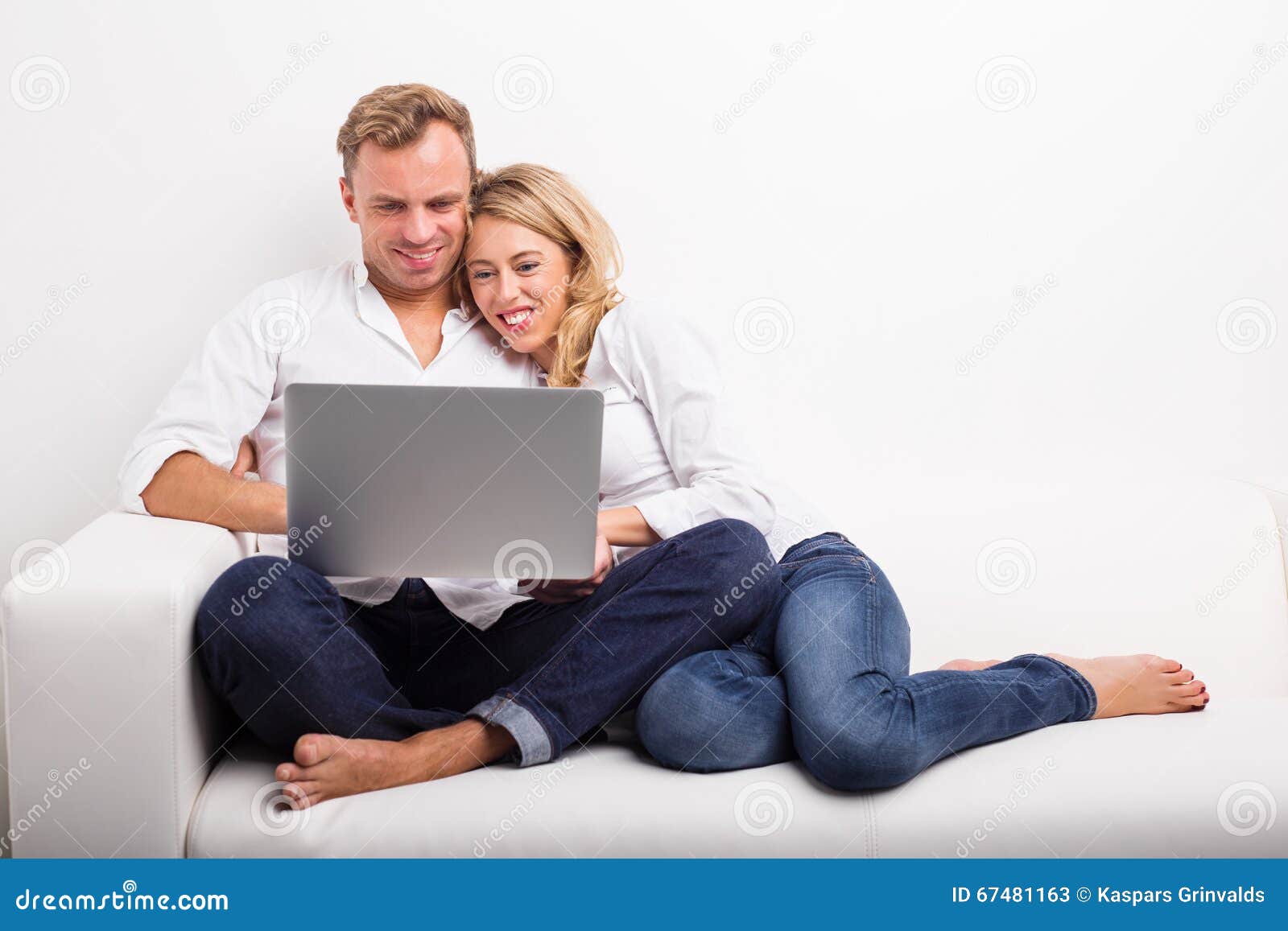 Couple using computer stock image. Image of lifestyle - 67481163