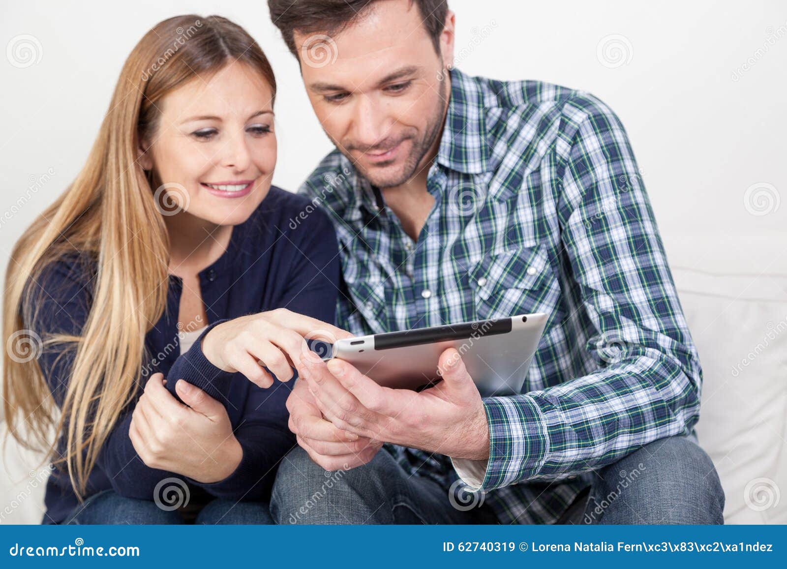 Couple using the ipad stock image. Image of ipad, relaxed - 62740319