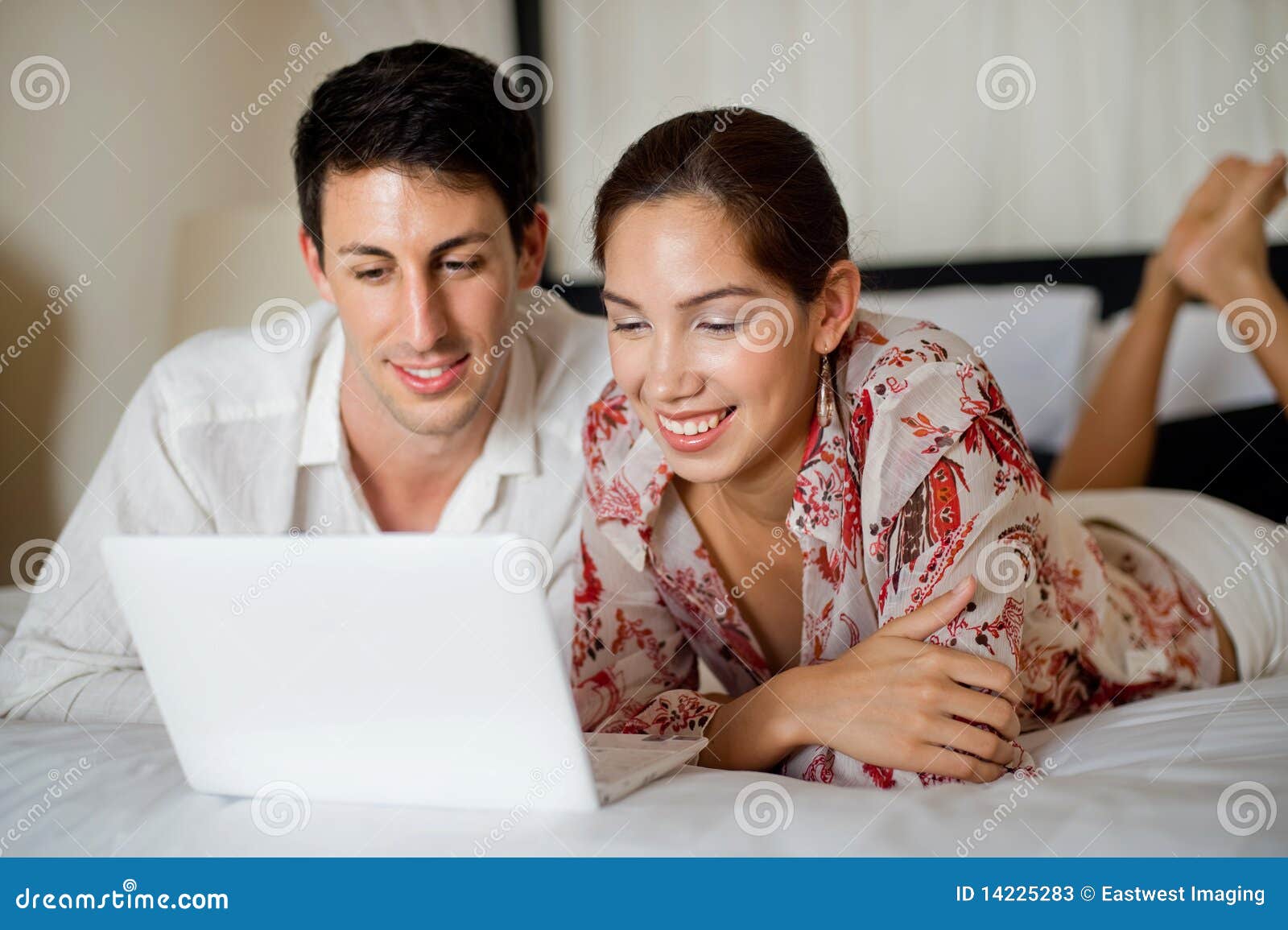 Couple Using Laptop stock image. Image of happy, communication - 14225283
