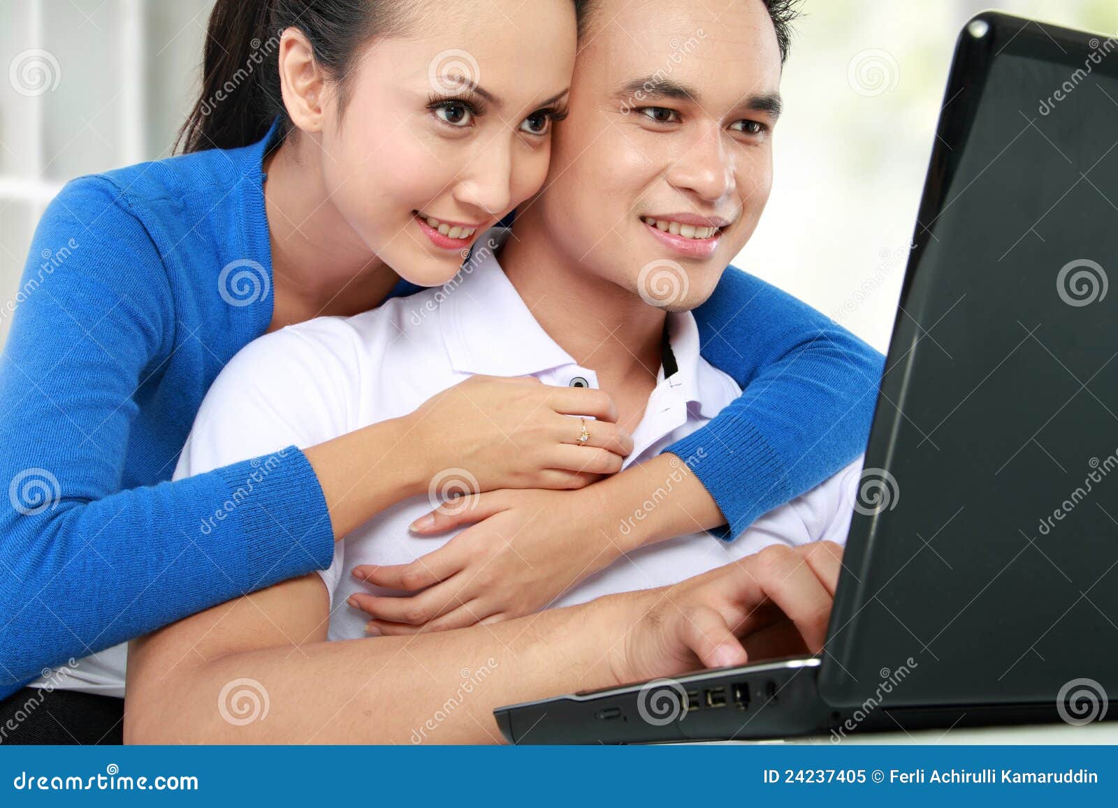 Couple using laptop stock image. Image of adult, background - 24237405
