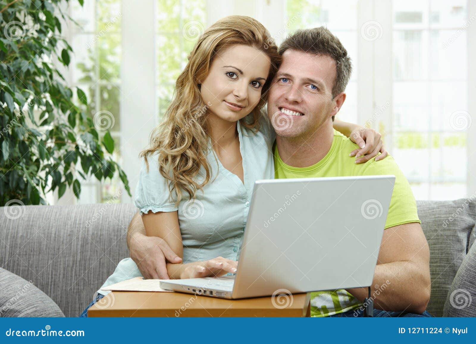 Couple Using Laptop Computer Stock Photo - Image of husband, casual ...
