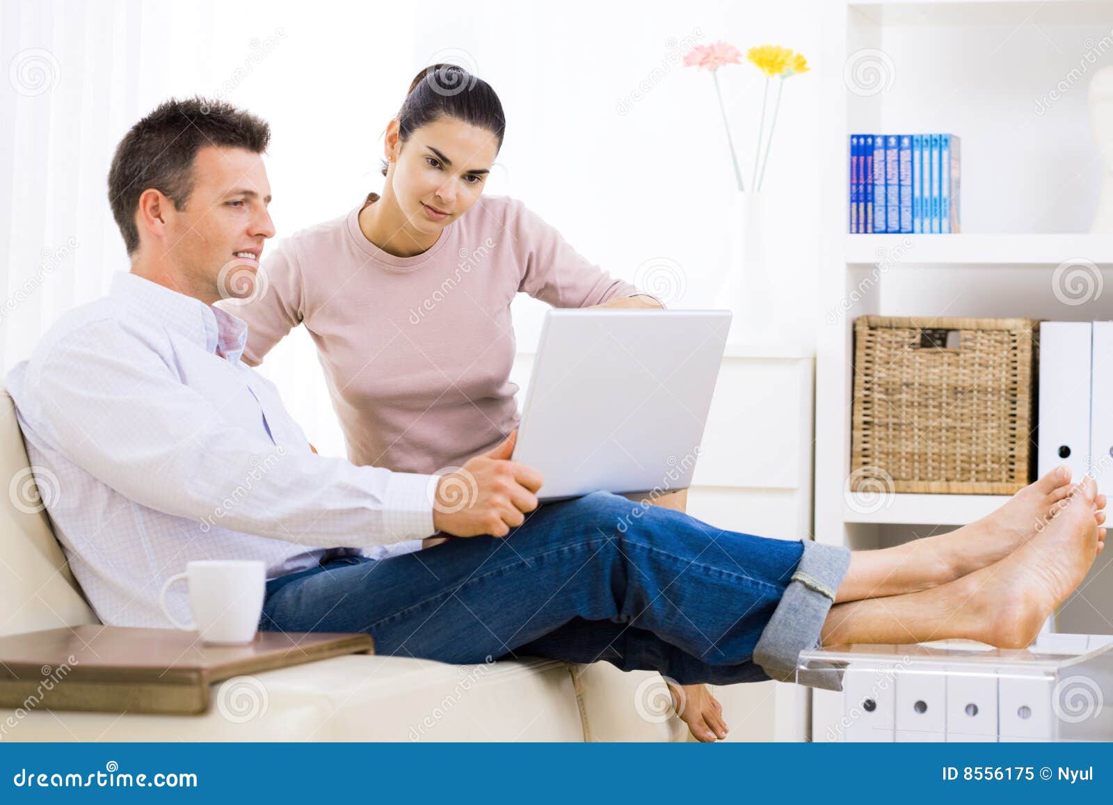 Couple Using Laptop Computer Stock Image - Image of green, hold: 8556175