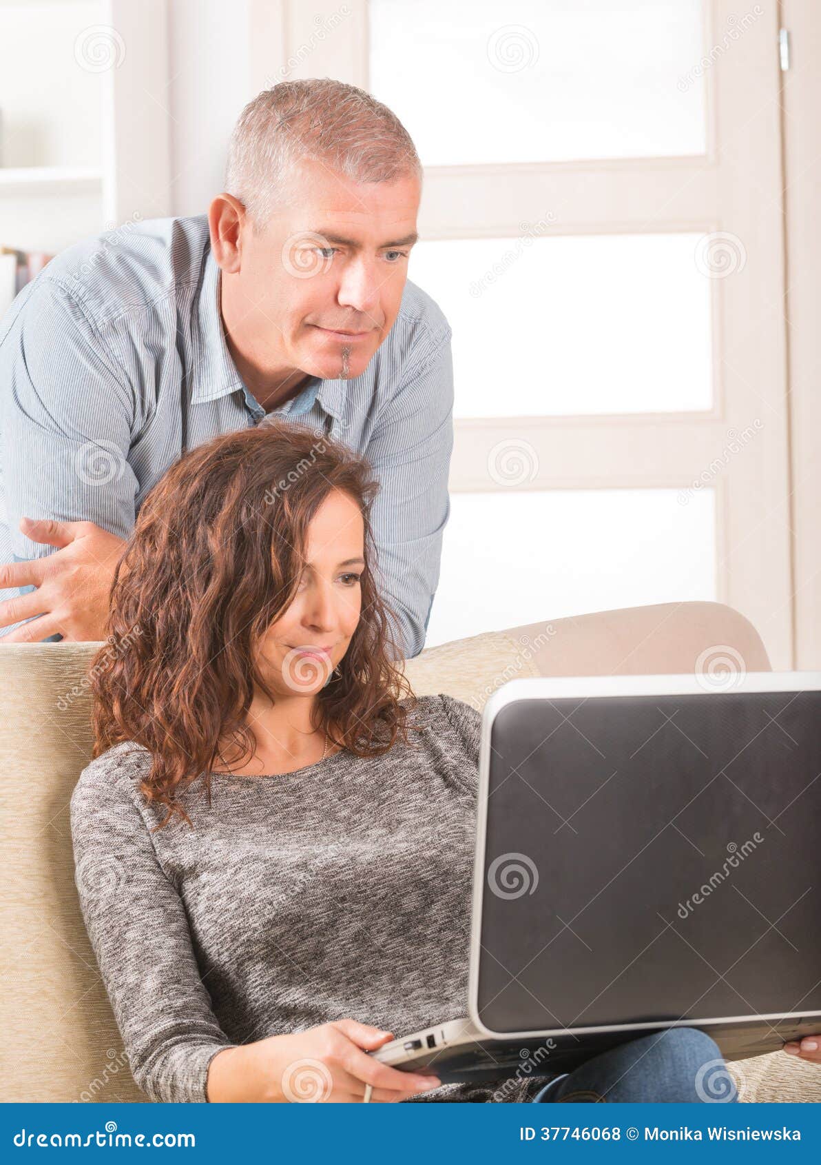 Couple Using Laptop at Home Stock Photo - Image of internet, home: 37746068
