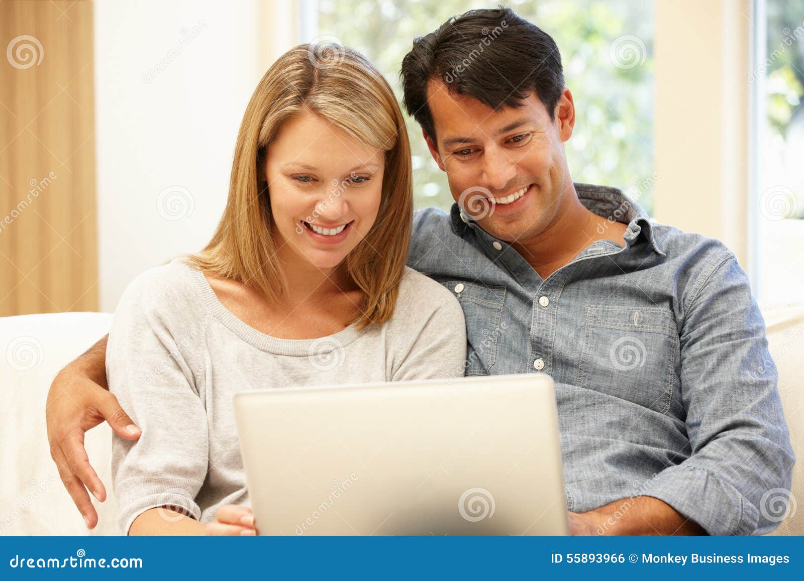 Couple Using Laptop at Home Stock Photo - Image of husband, affection ...