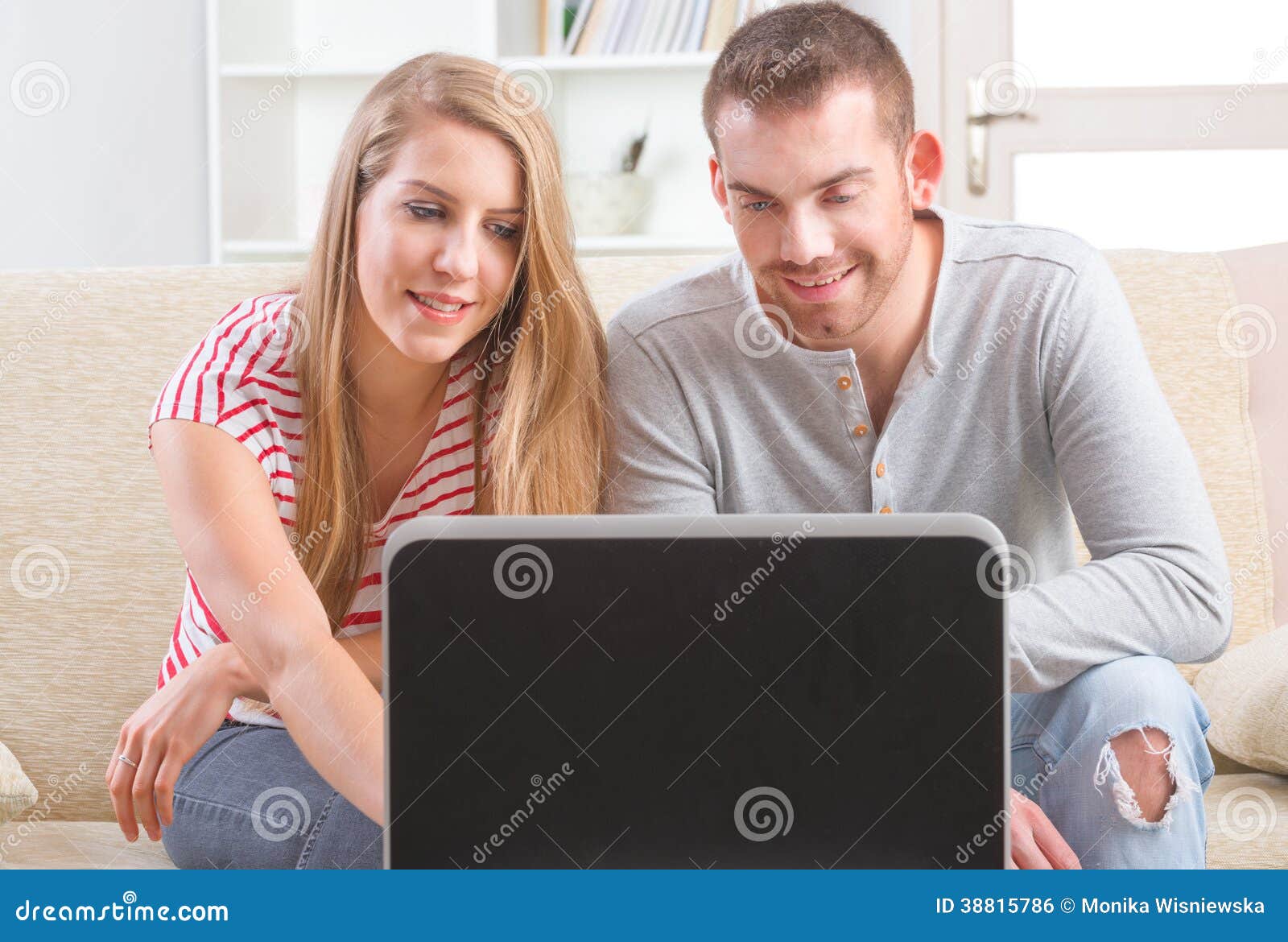 Couple Using Laptop at Home Stock Photo - Image of male, female: 38815786