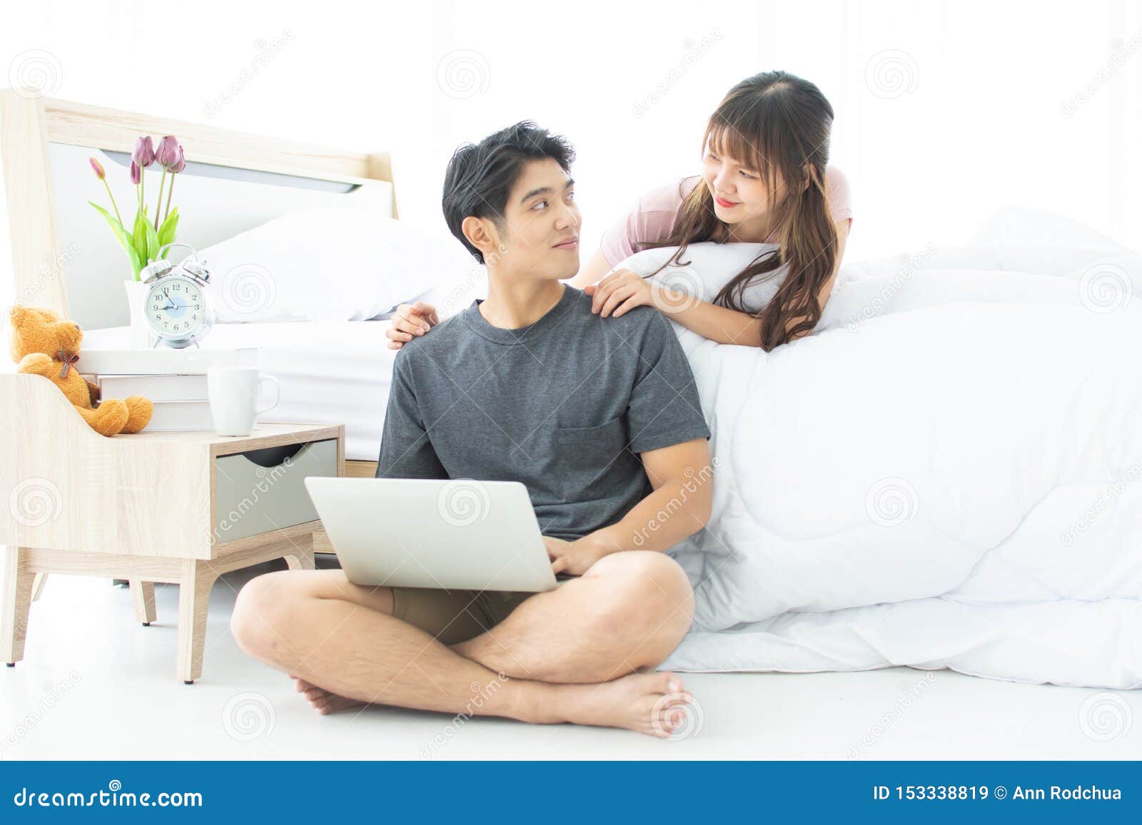 A Couple is Using Laptop in Their Bedroom Stock Image - Image of hygge ...